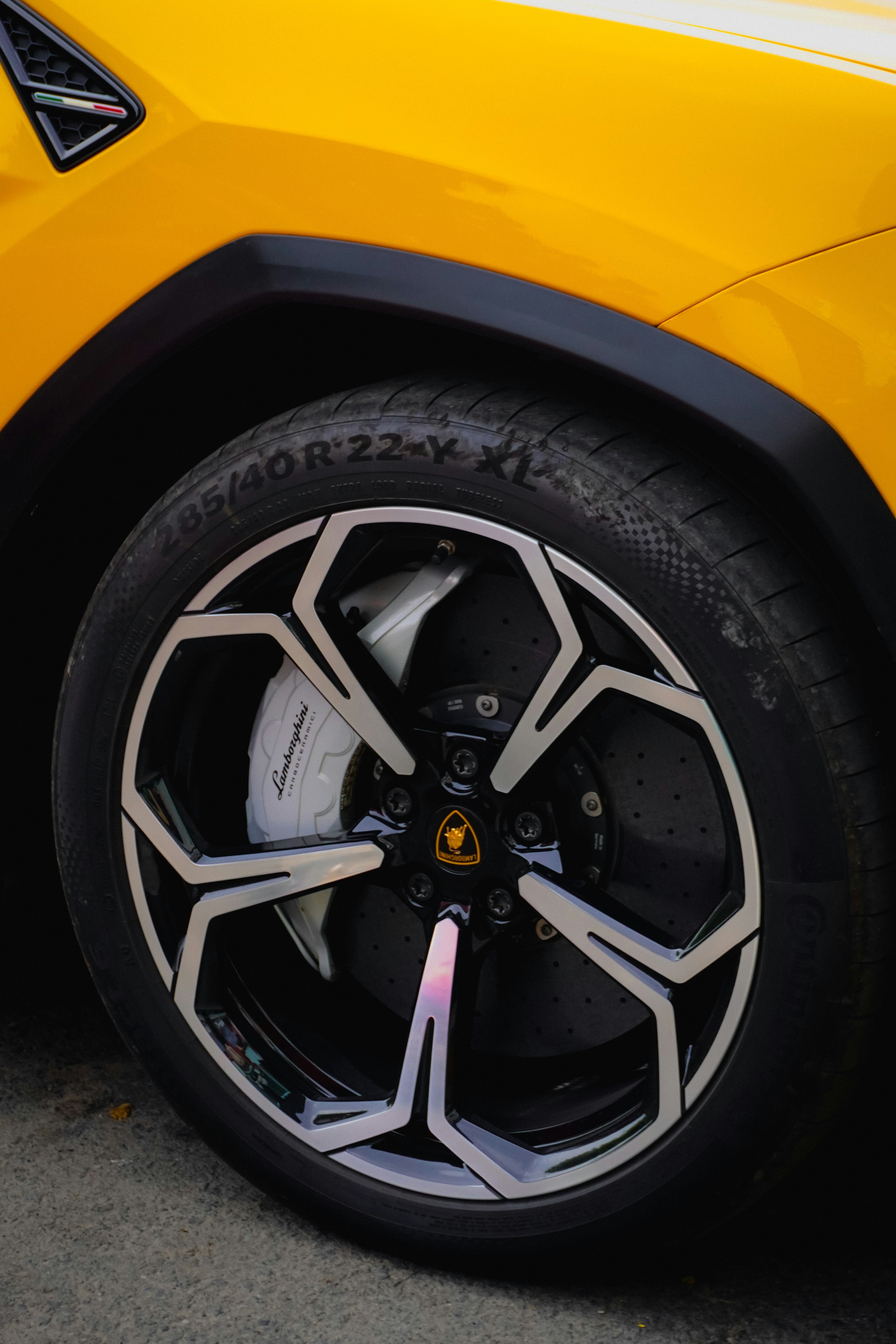 Yellow Curves and Precise Lines: Lamborghini Wheel in Focus