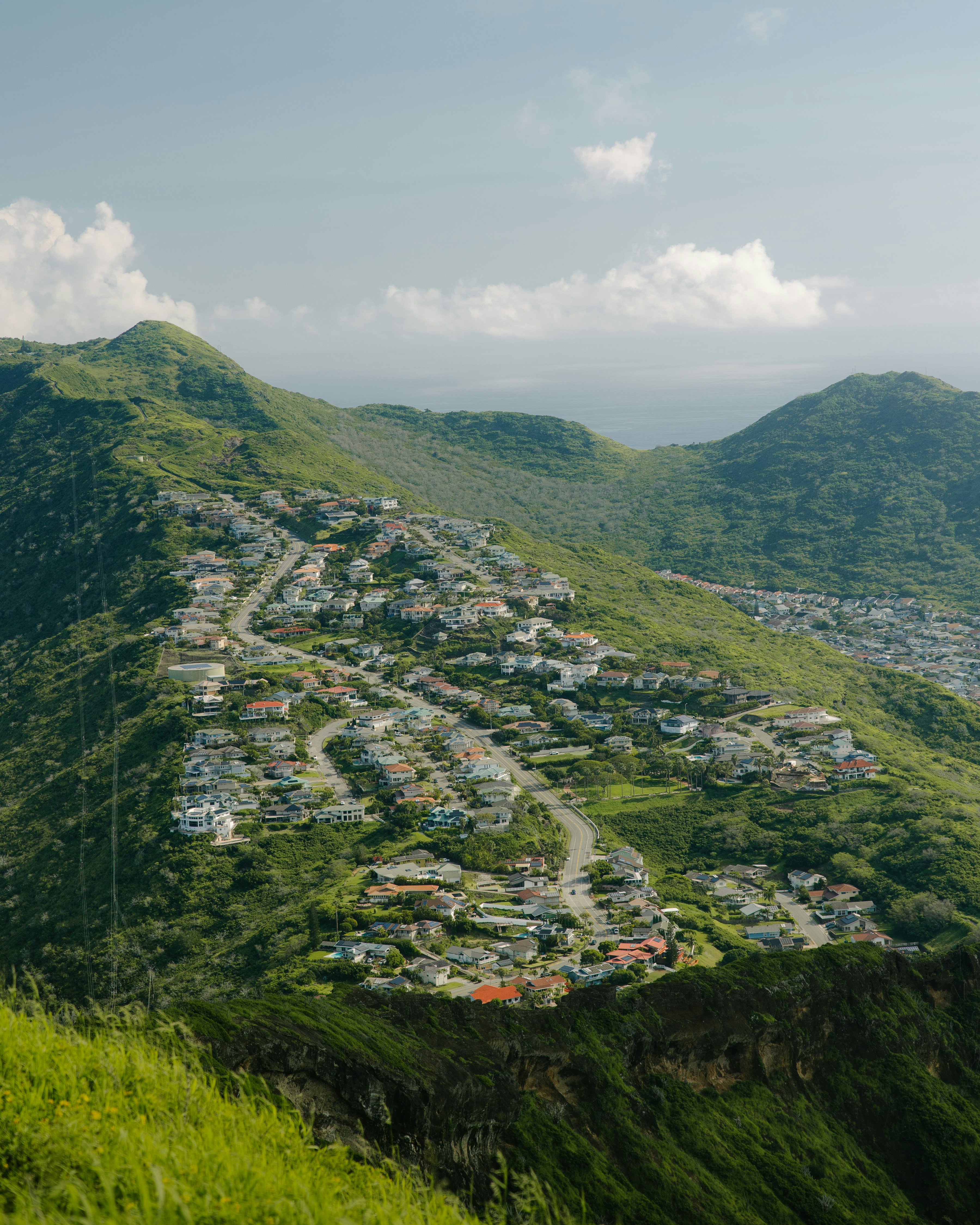 Terraced Village Carved into a Green Ridge