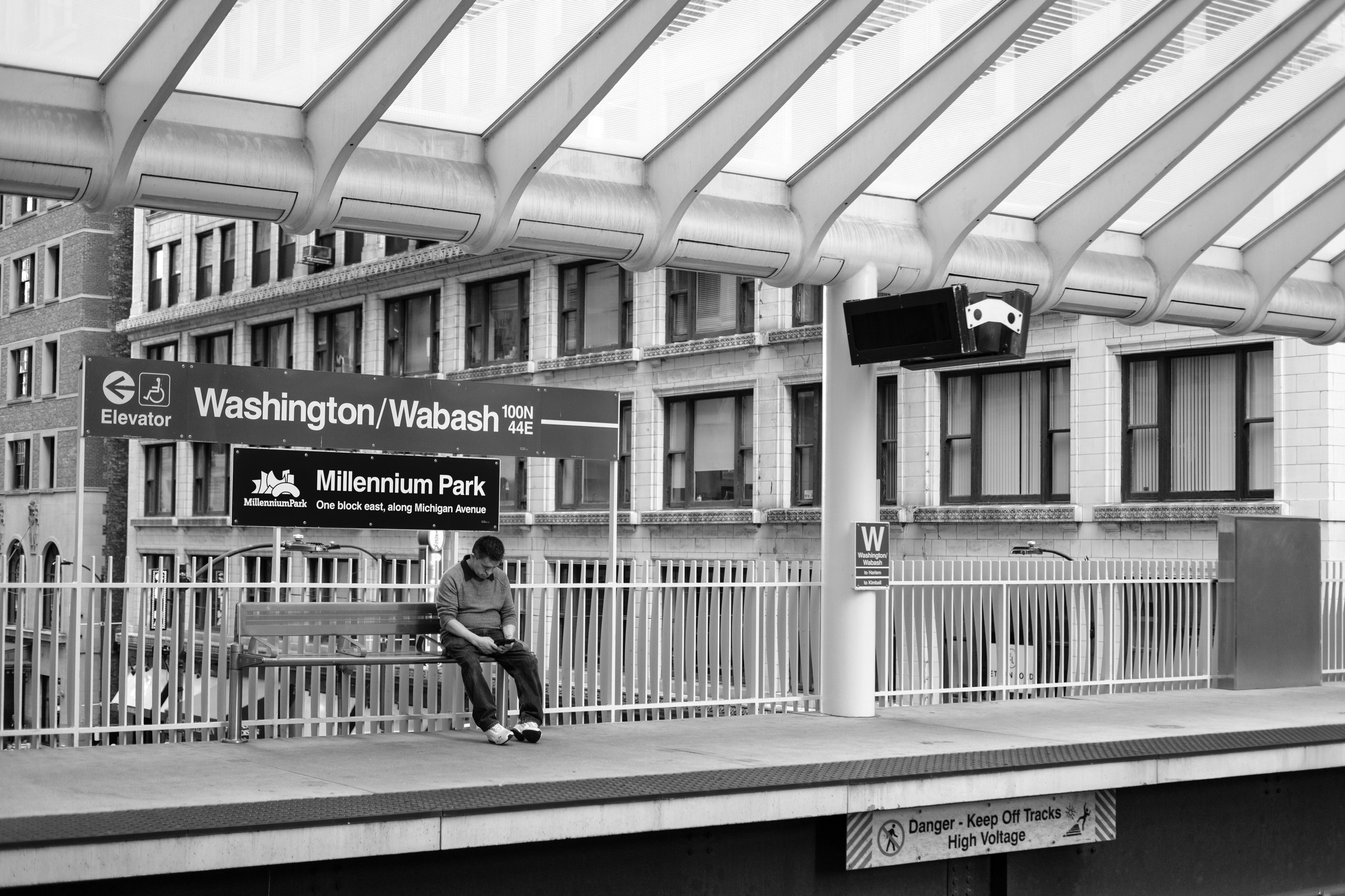 Platform Solitude beneath a Glass Canopy