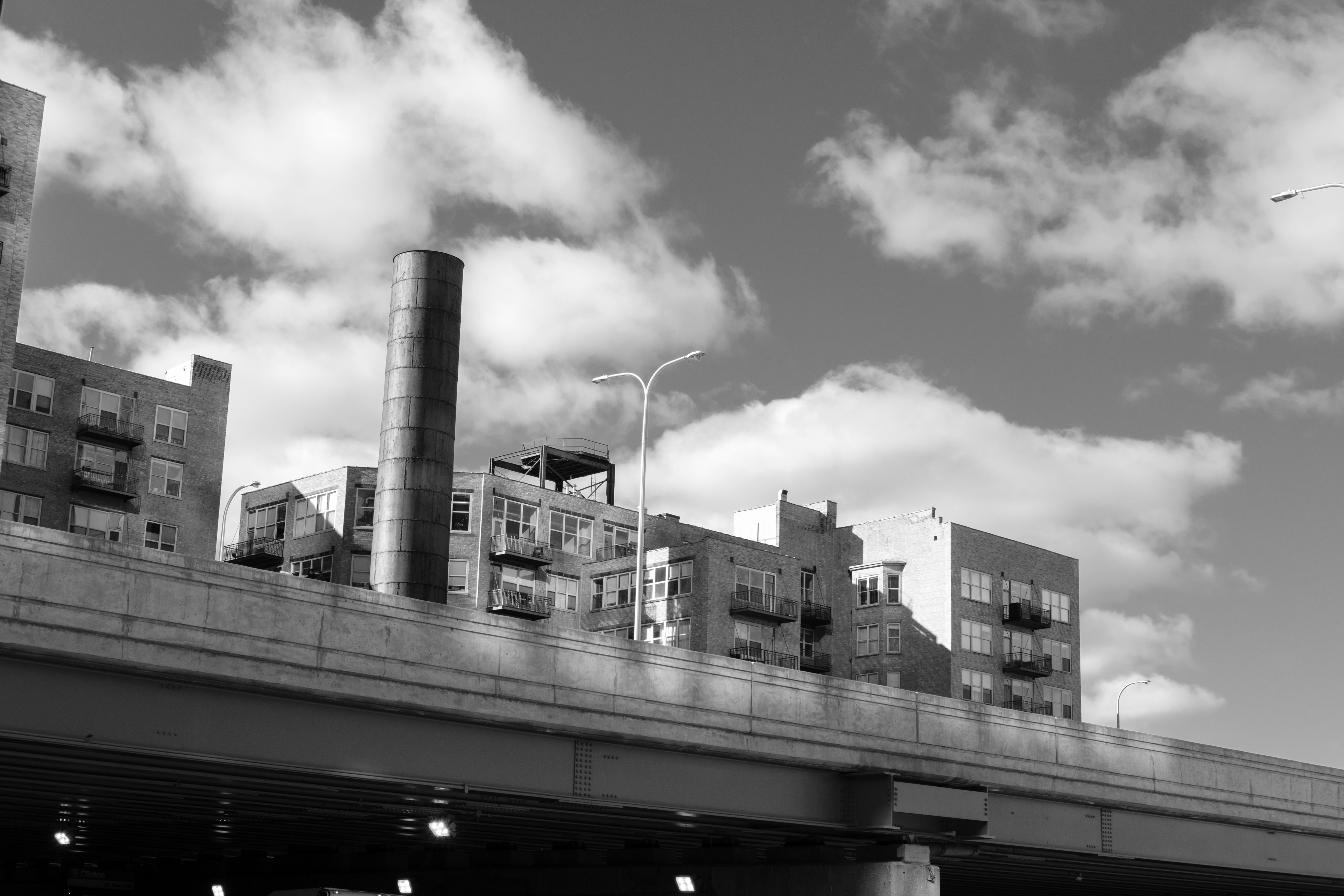 Urban Skyline in Monochrome: Bridges, Buildings, and Sky