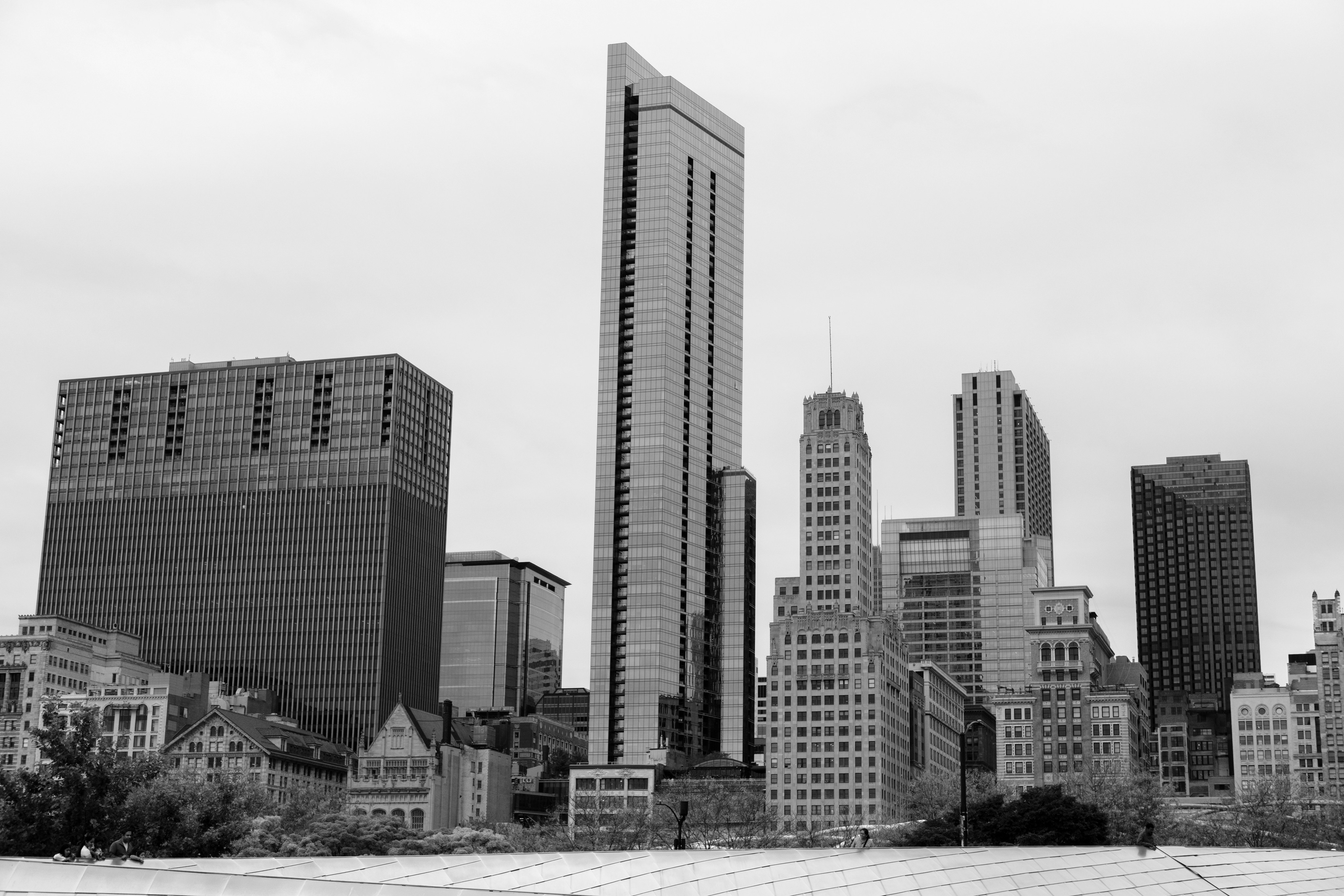 Urban Cliffhanger: A Monochrome Skyline Rising Over the Waterfront