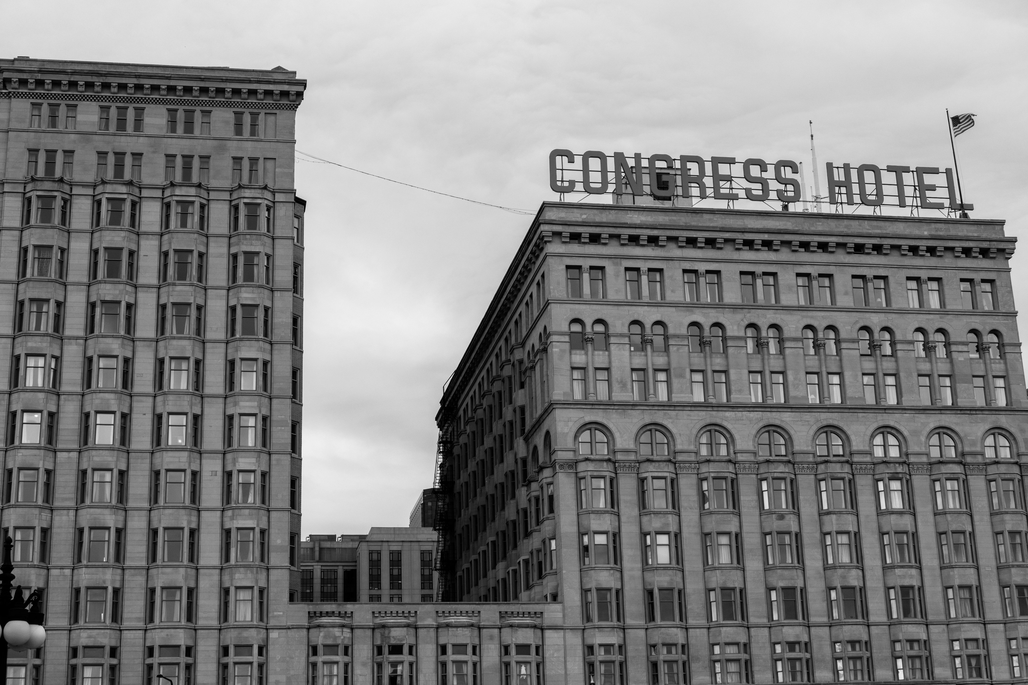 Two Historic Facades Ascend: A City Crowned by the Congress Hotel