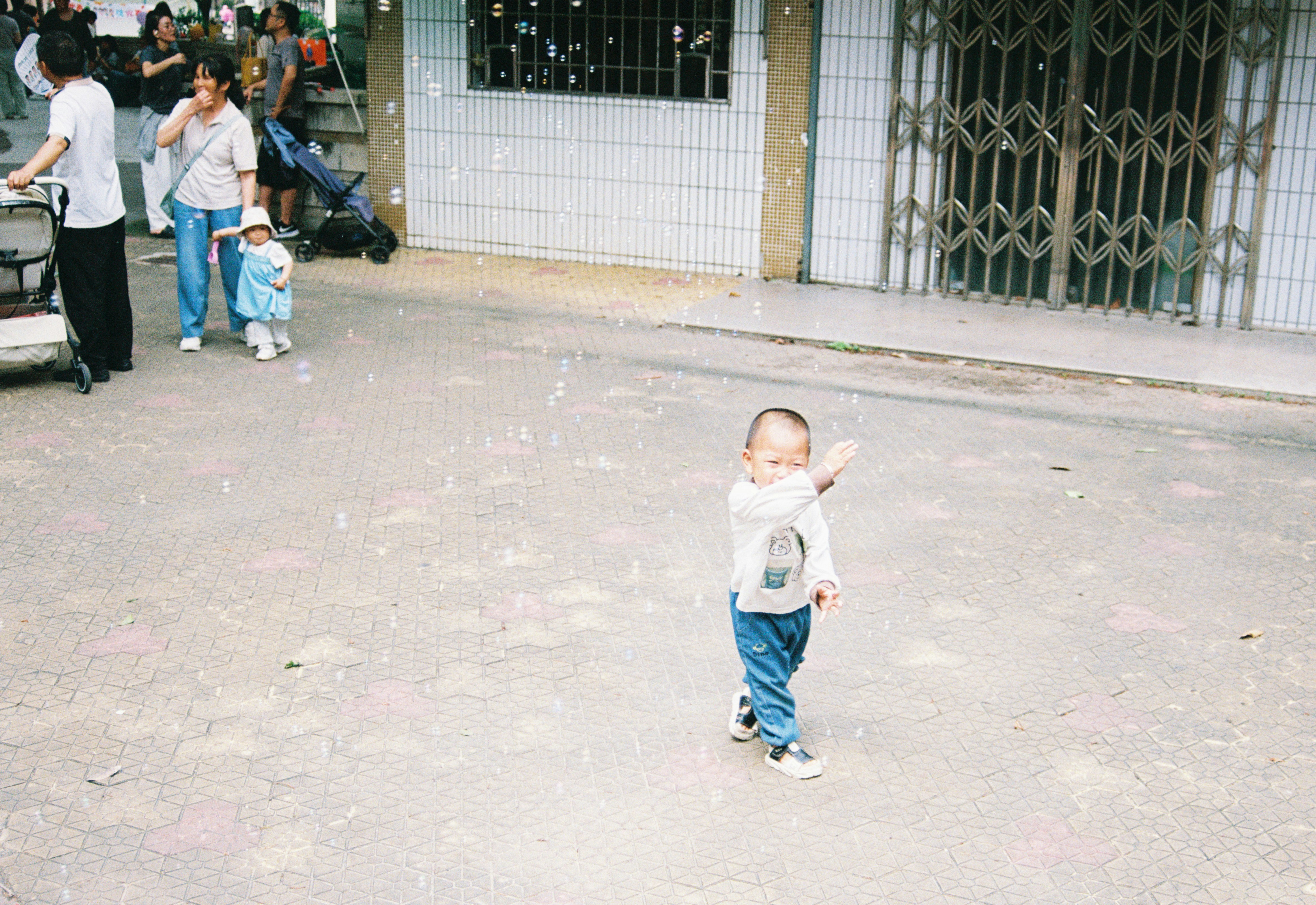 Young Explorer in an Urban Courtyard