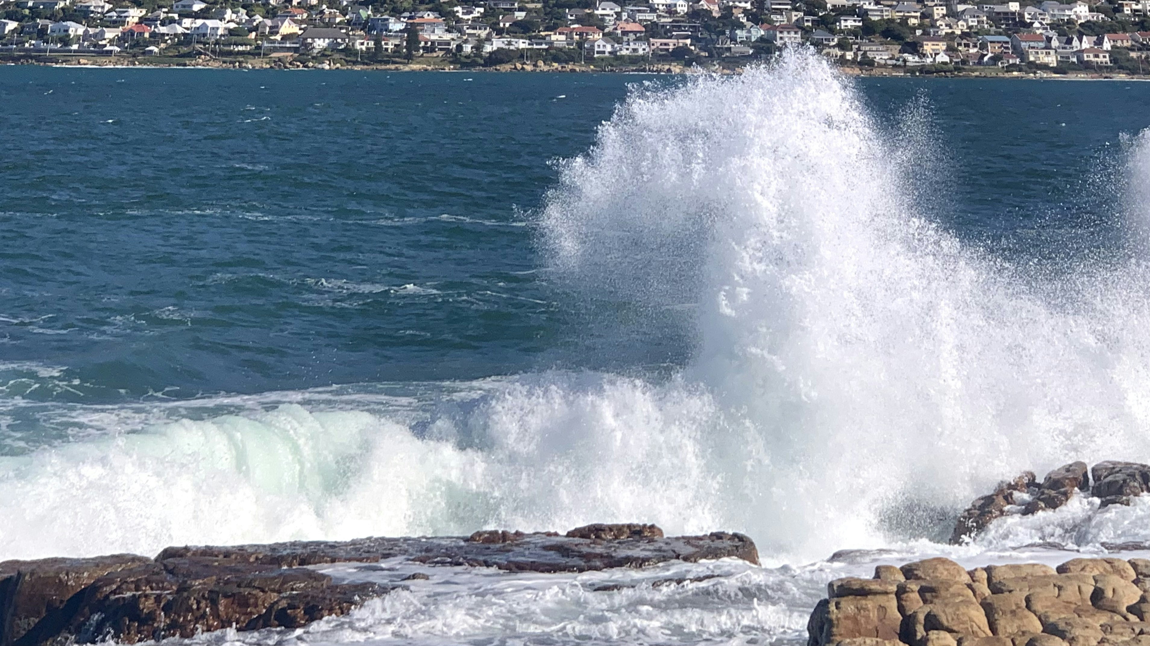 Cresting Break at Rocky Shoreline