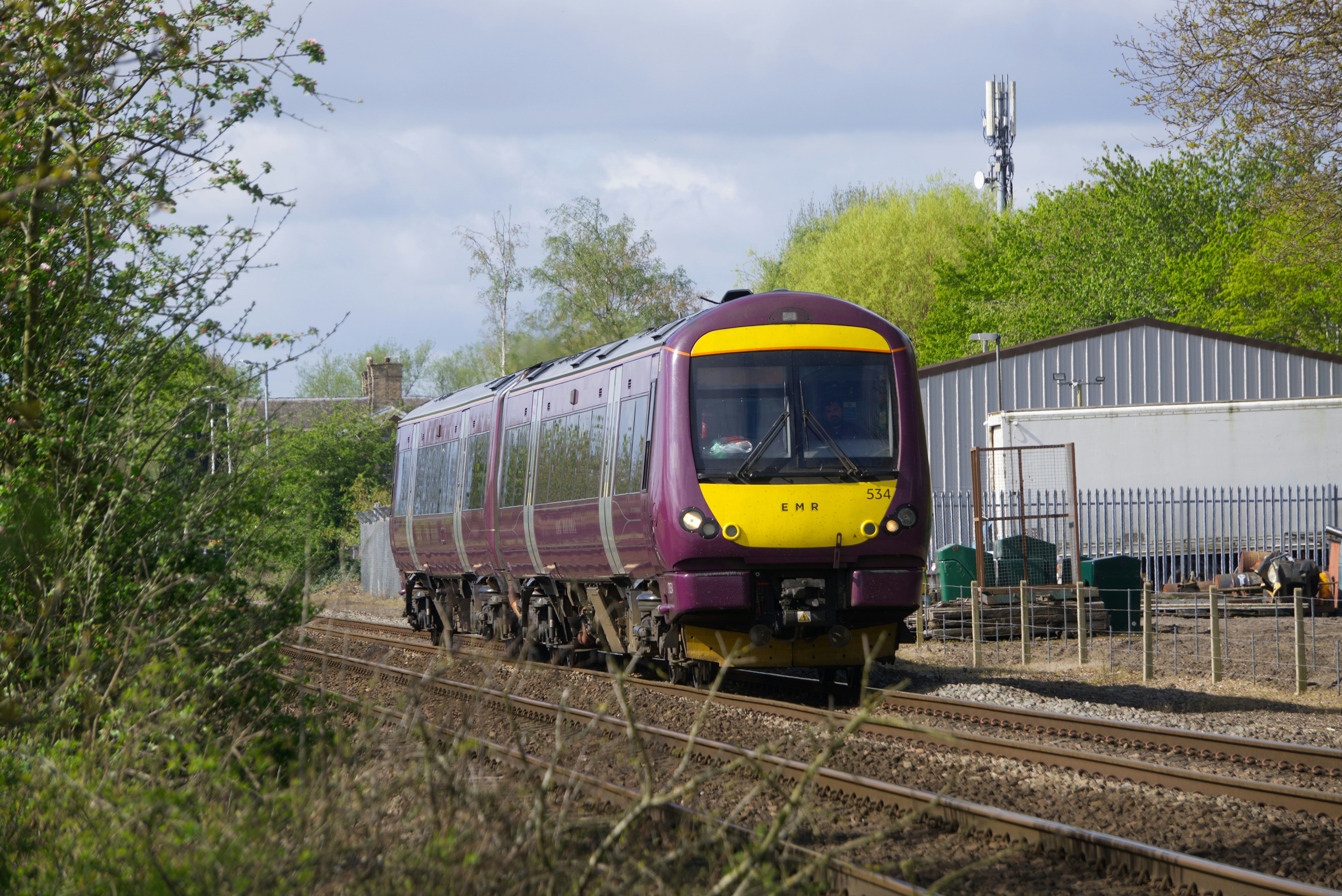 Magenta Passenger: A Commuter Train Clocks in on the Rural Rails