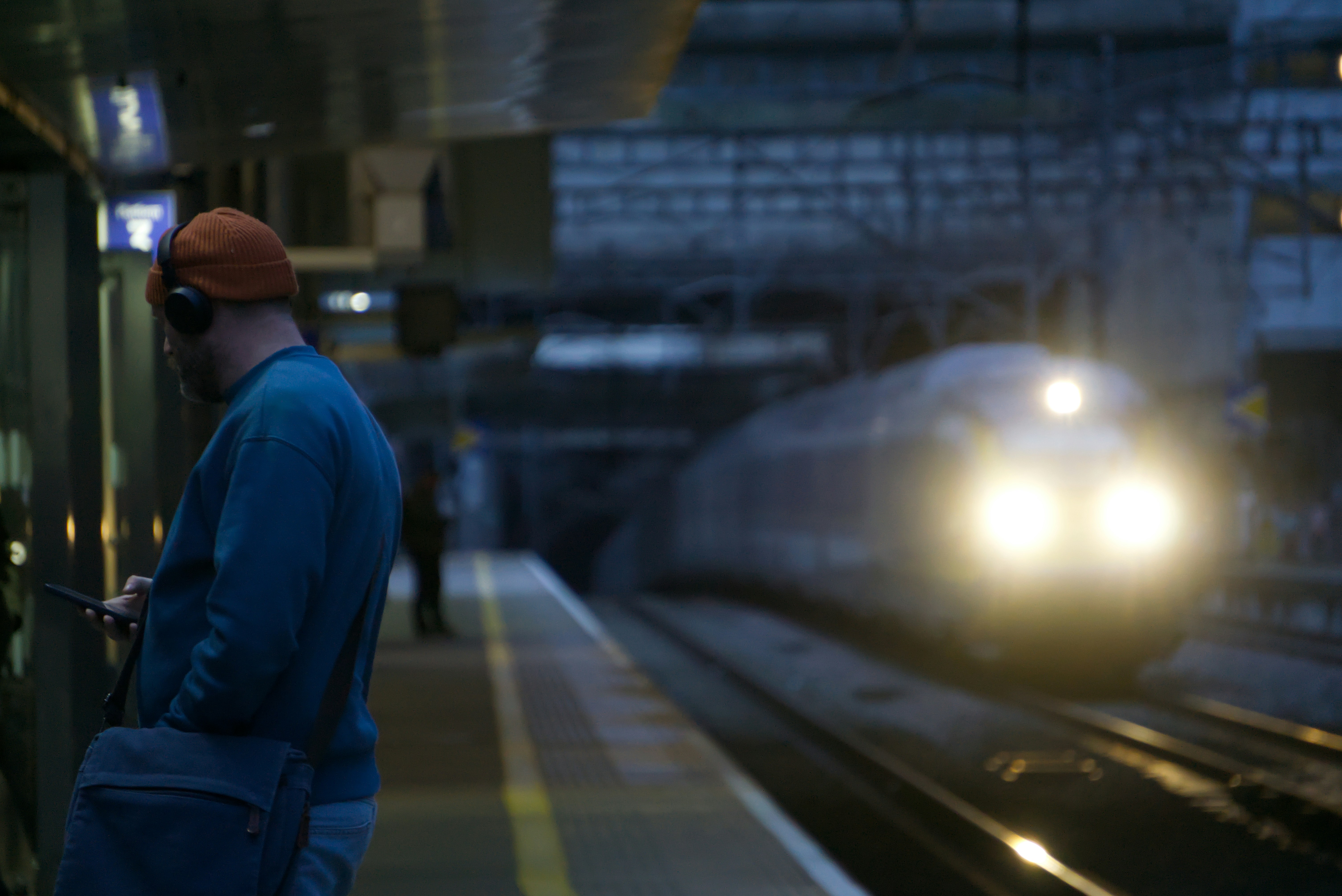 Platform Quiet: A Commuter in the Blue
