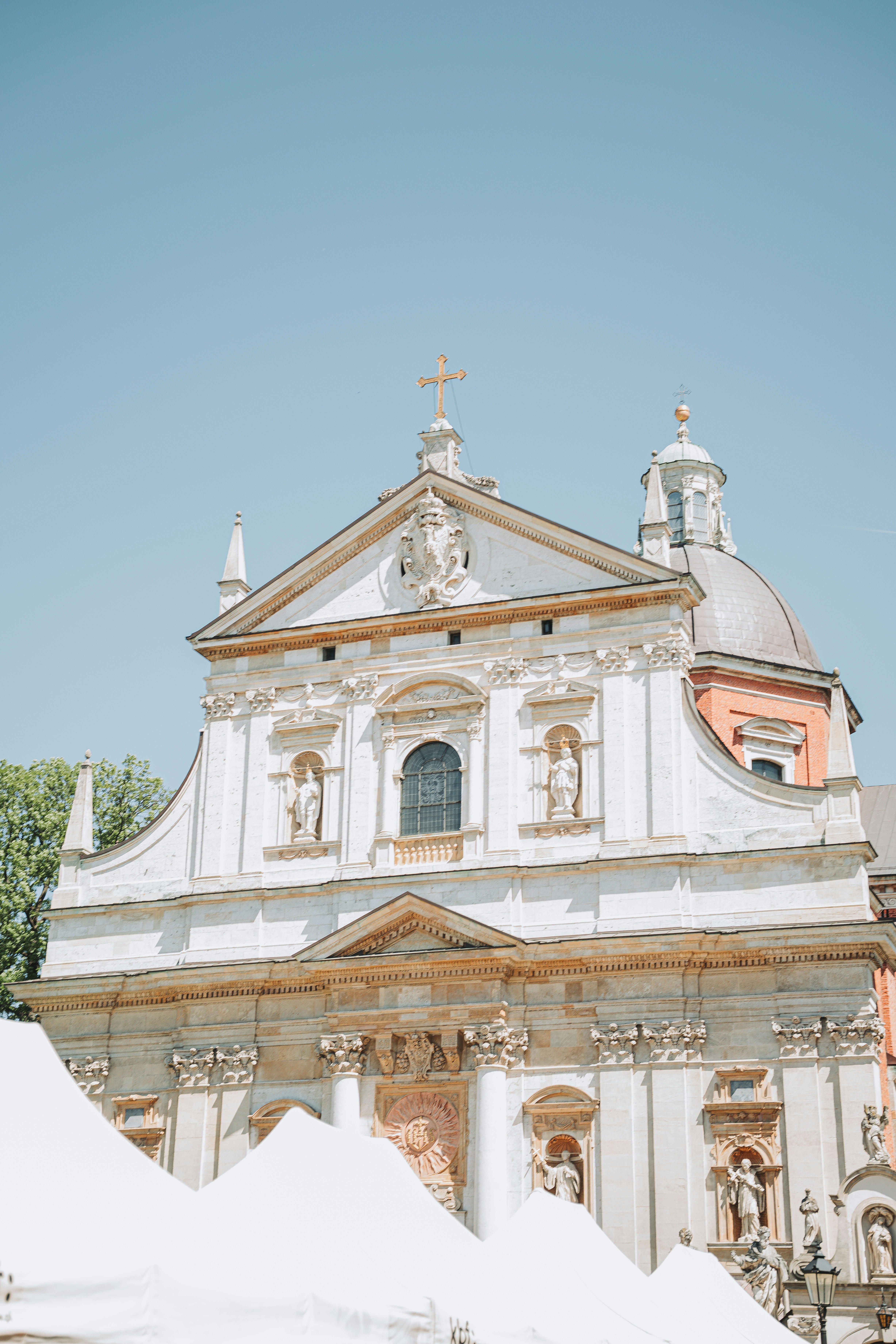 Facade of Saintly Grandeur: Baroque Cathedral with Crescent Dome Peaks