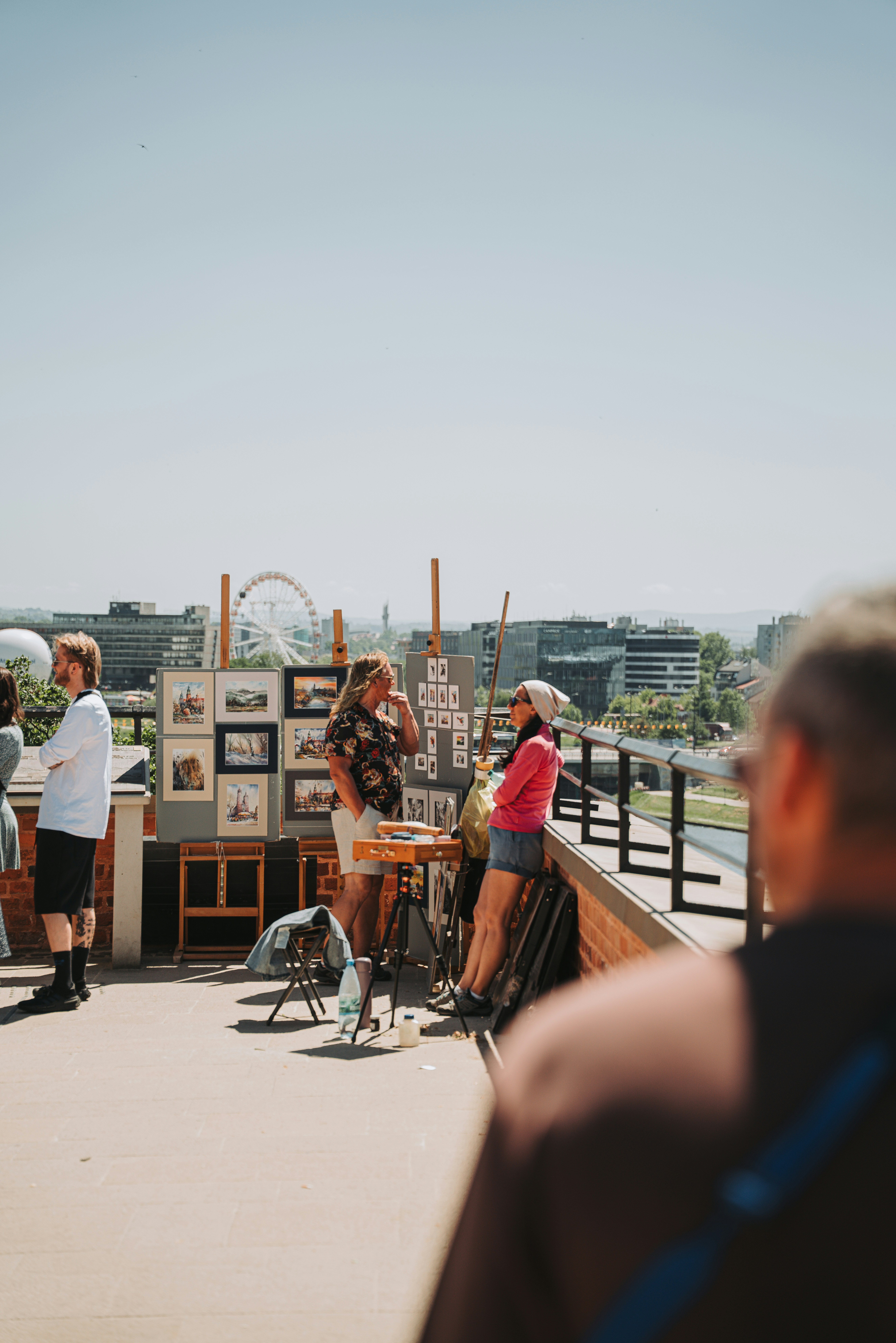 Rooftop Art Fair: Portraits, Chat, and a Picnic Fence