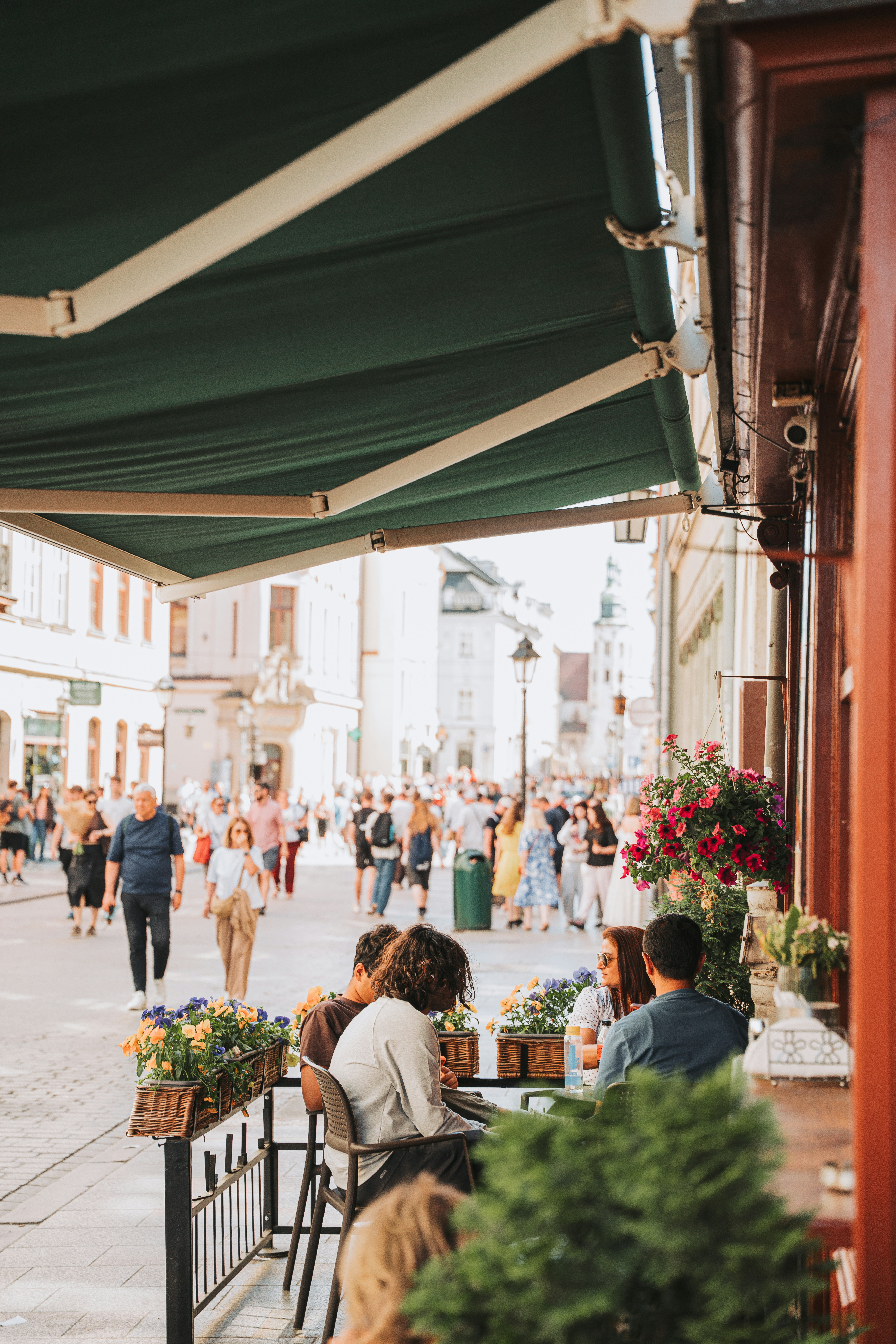 Café Terrace in a Sunlit European Street