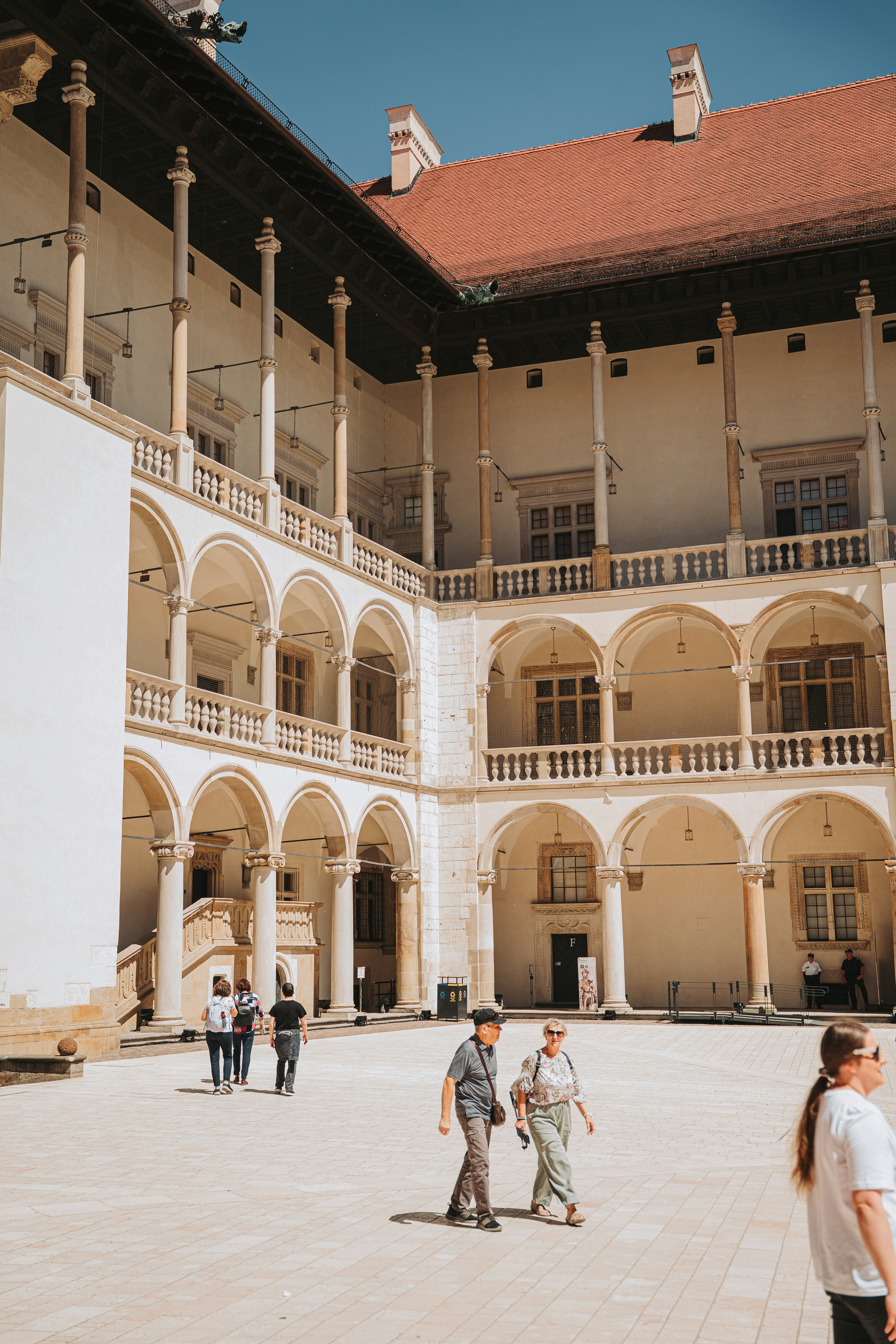 Sunlit Courtyard of an Elegant Arcaded Palace