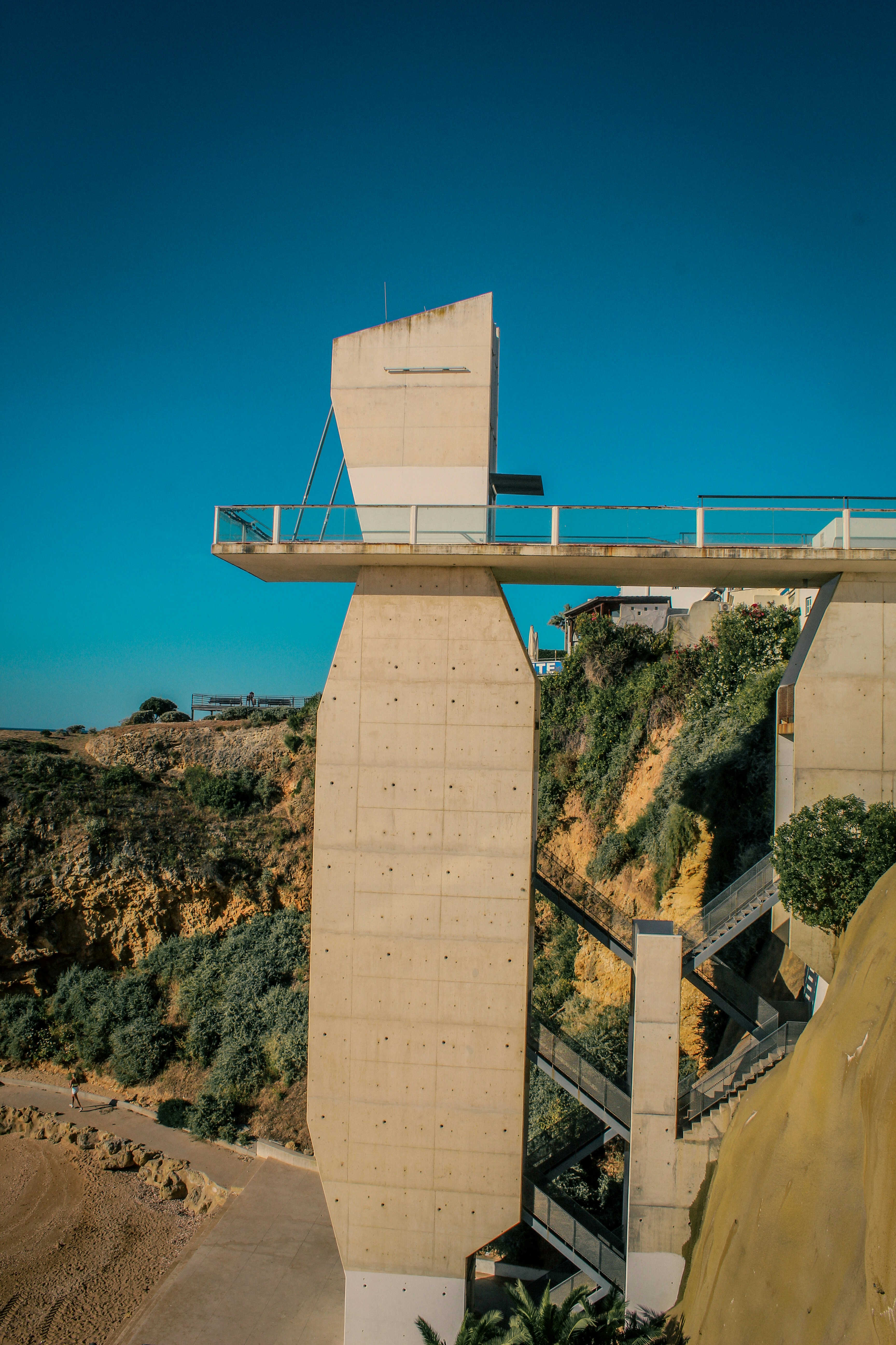 Concrete Ascension: A Coastal Bridge Tower Reaches for the Sky