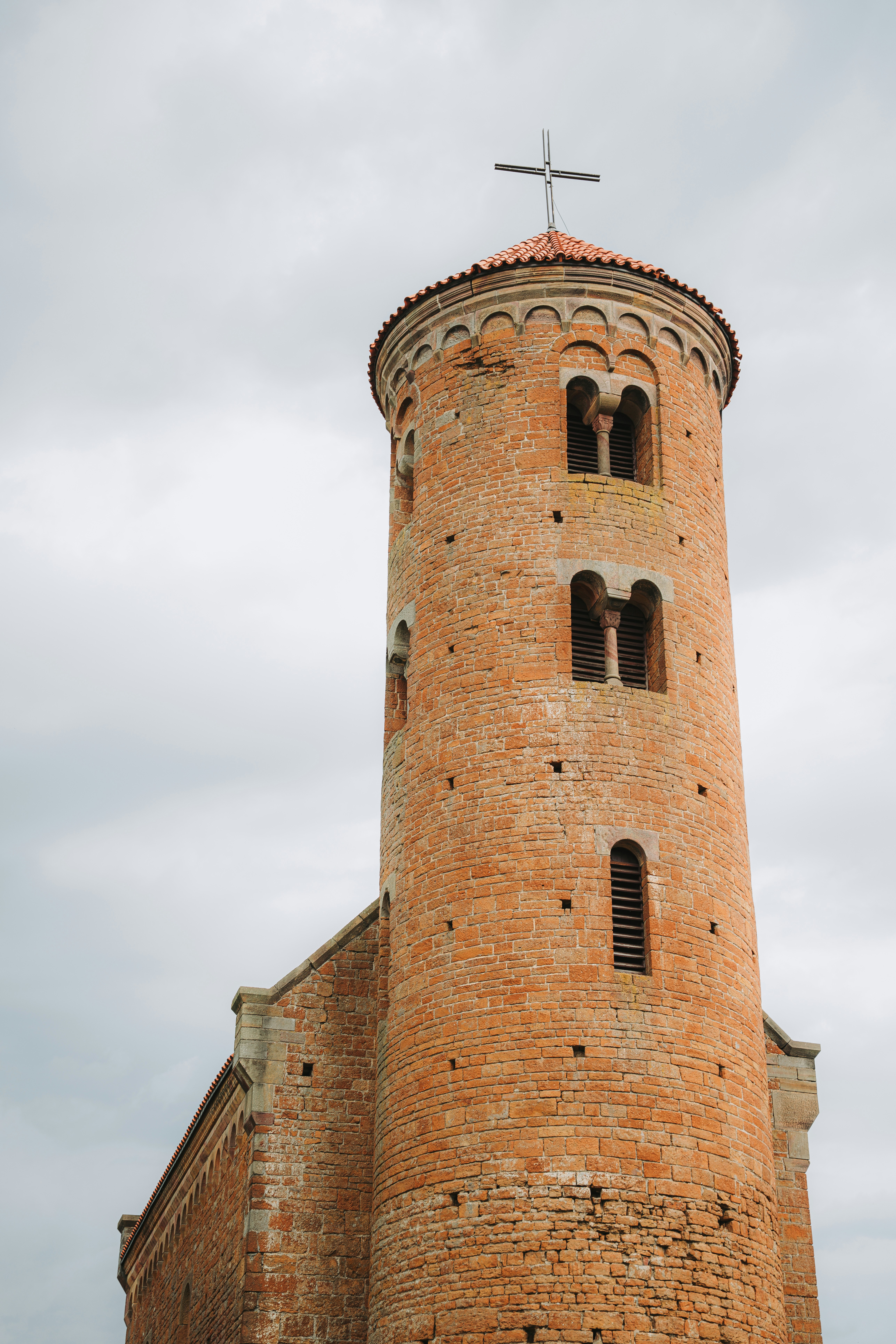 Tower of Terracotta: A Lone Brick Spire Reaching Toward the Sky