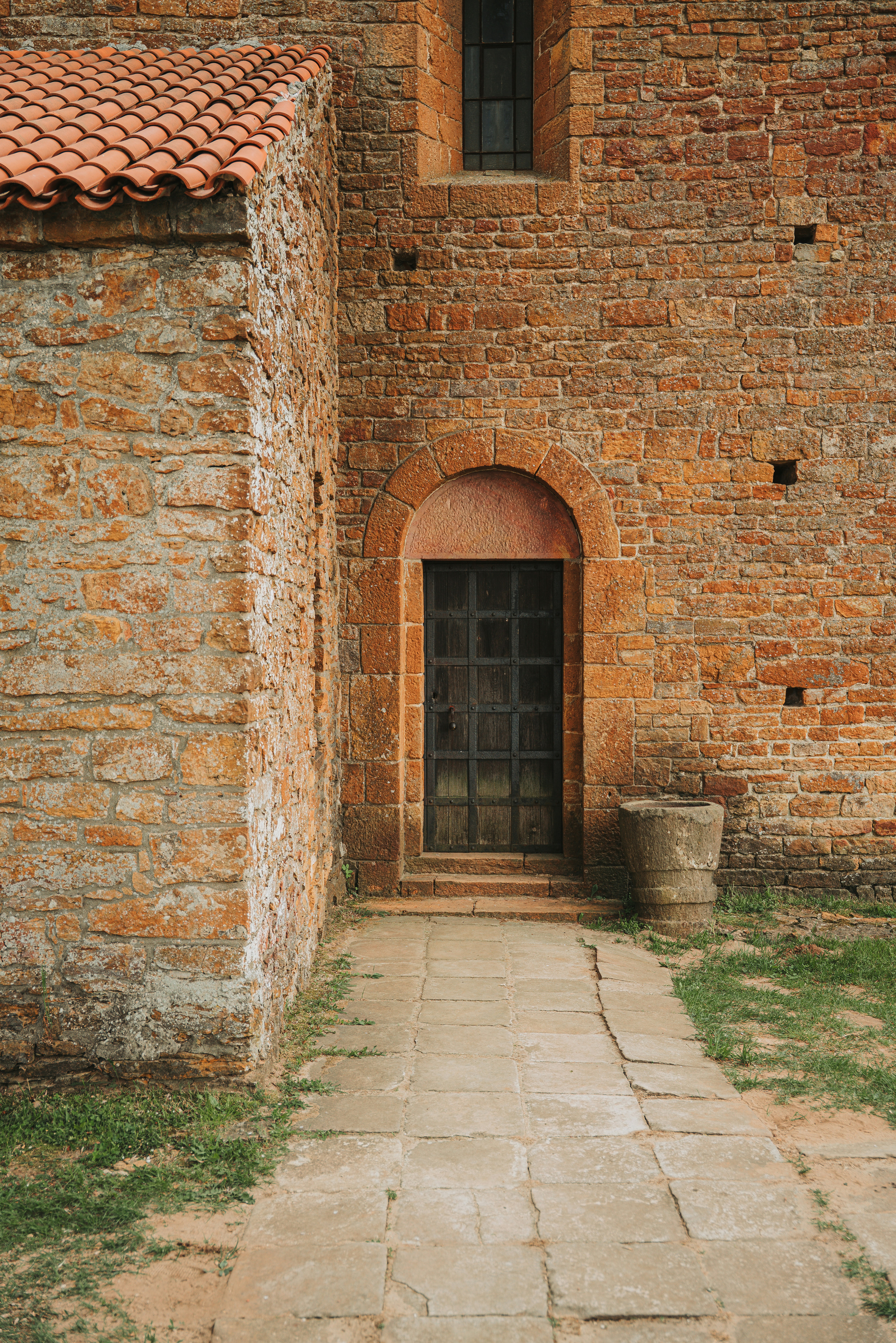 Arched Doorway in Weathered Brick Citadel
