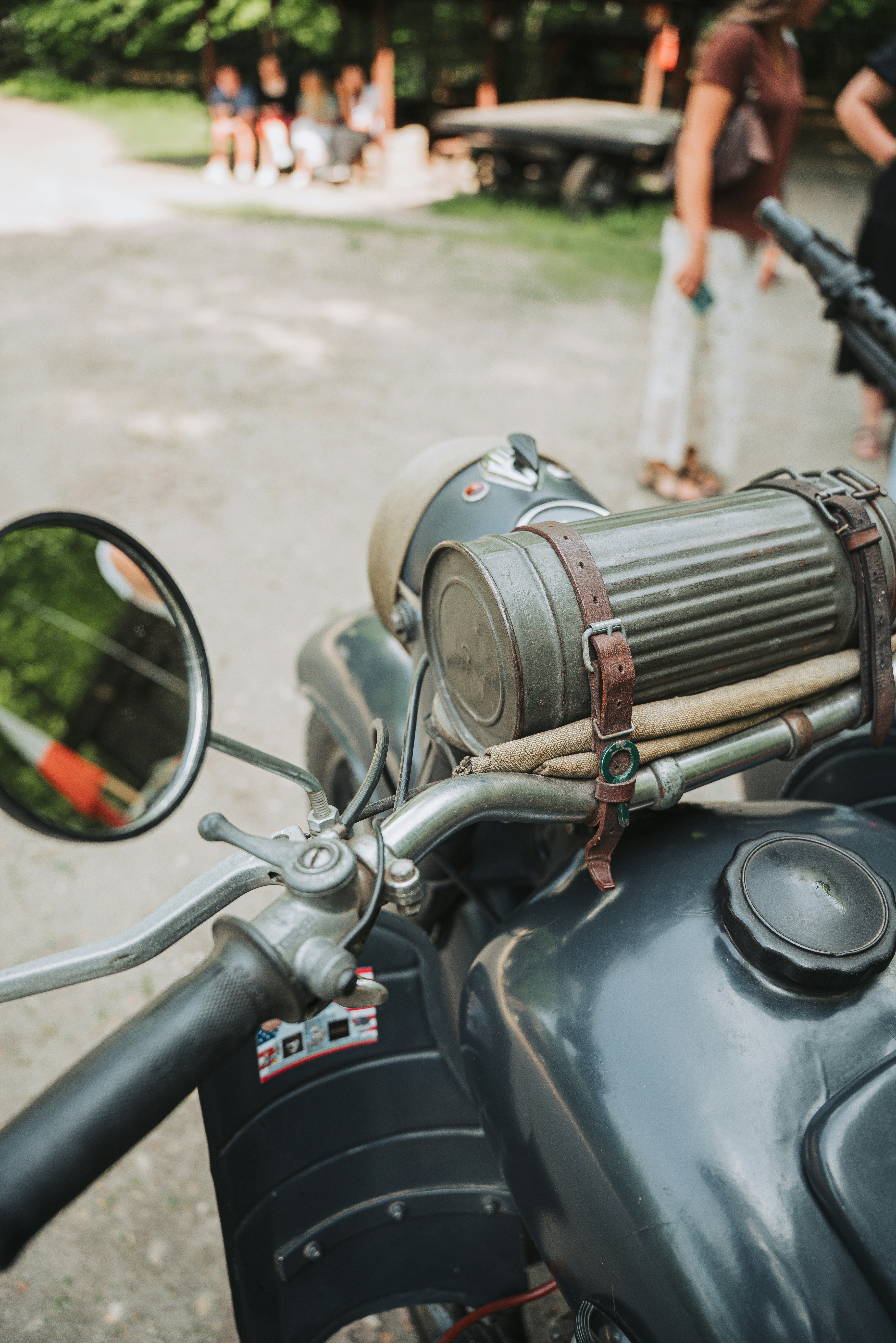 Motorcycle Remnant: A Timeworn Tank and Leather Straps