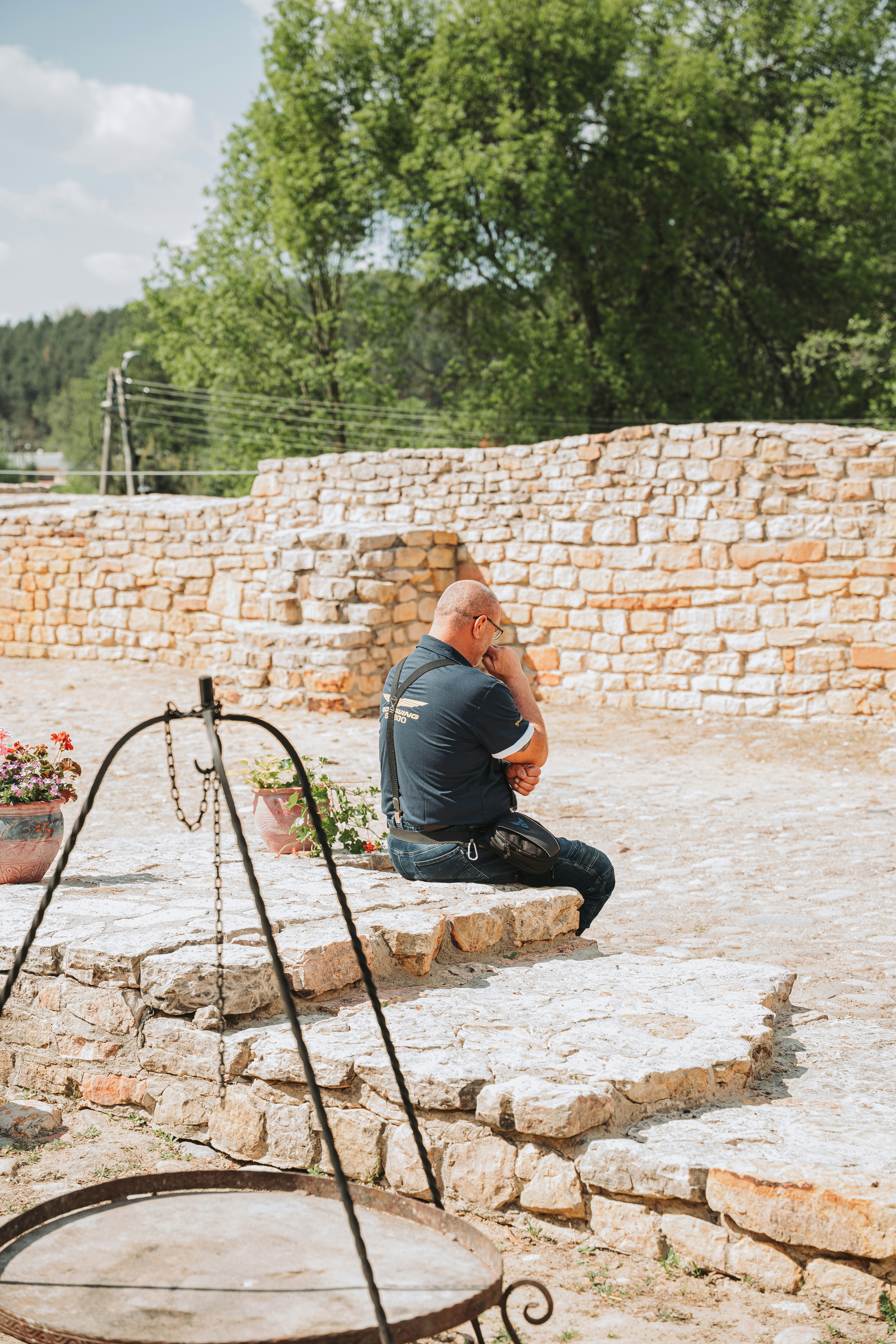 Benediction by the Stones: A Quiet Moment on Sunlit Steps