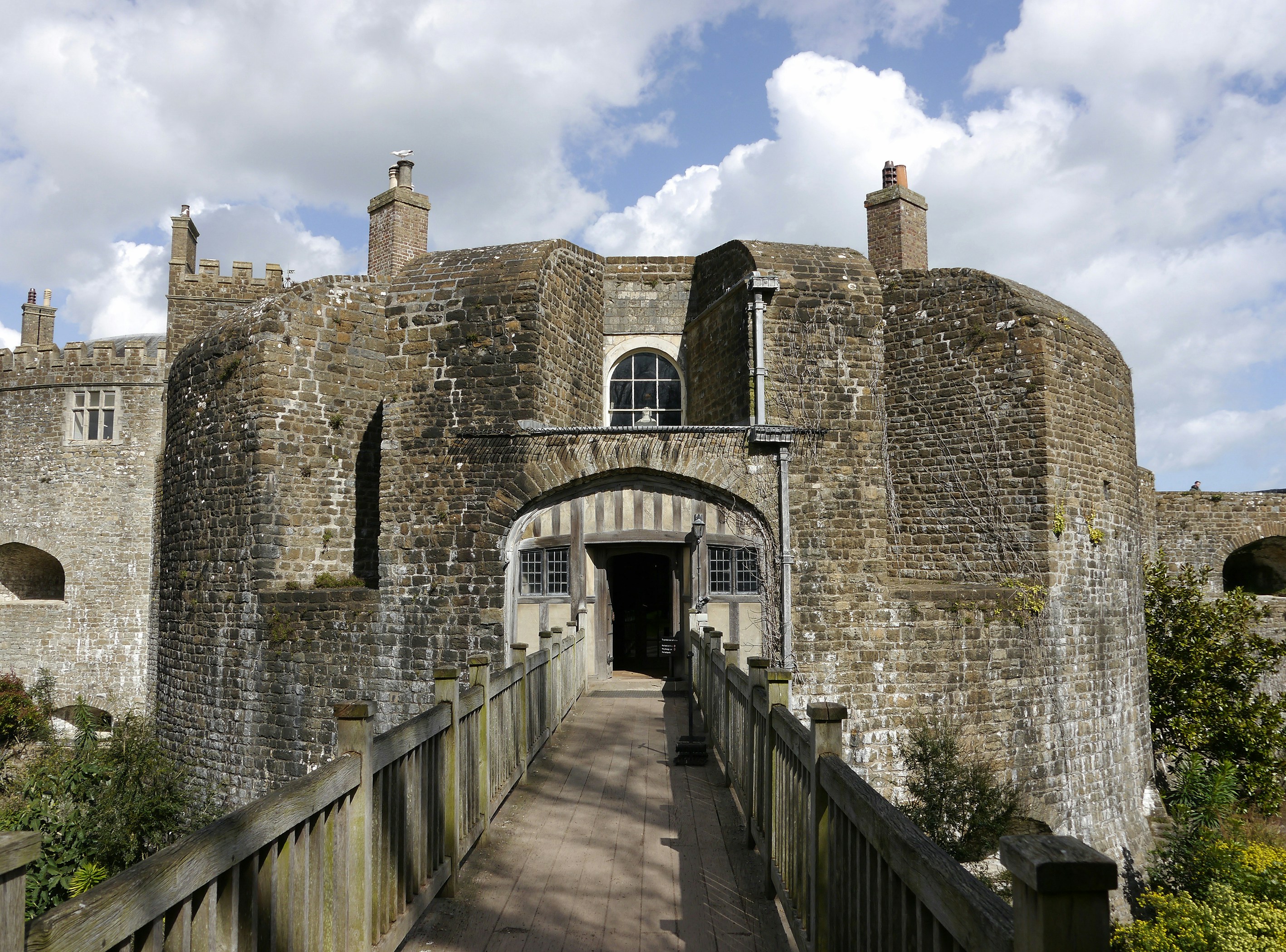 Stone Gatehouse Over a Wooden Viaduct: A Fortress Entrance