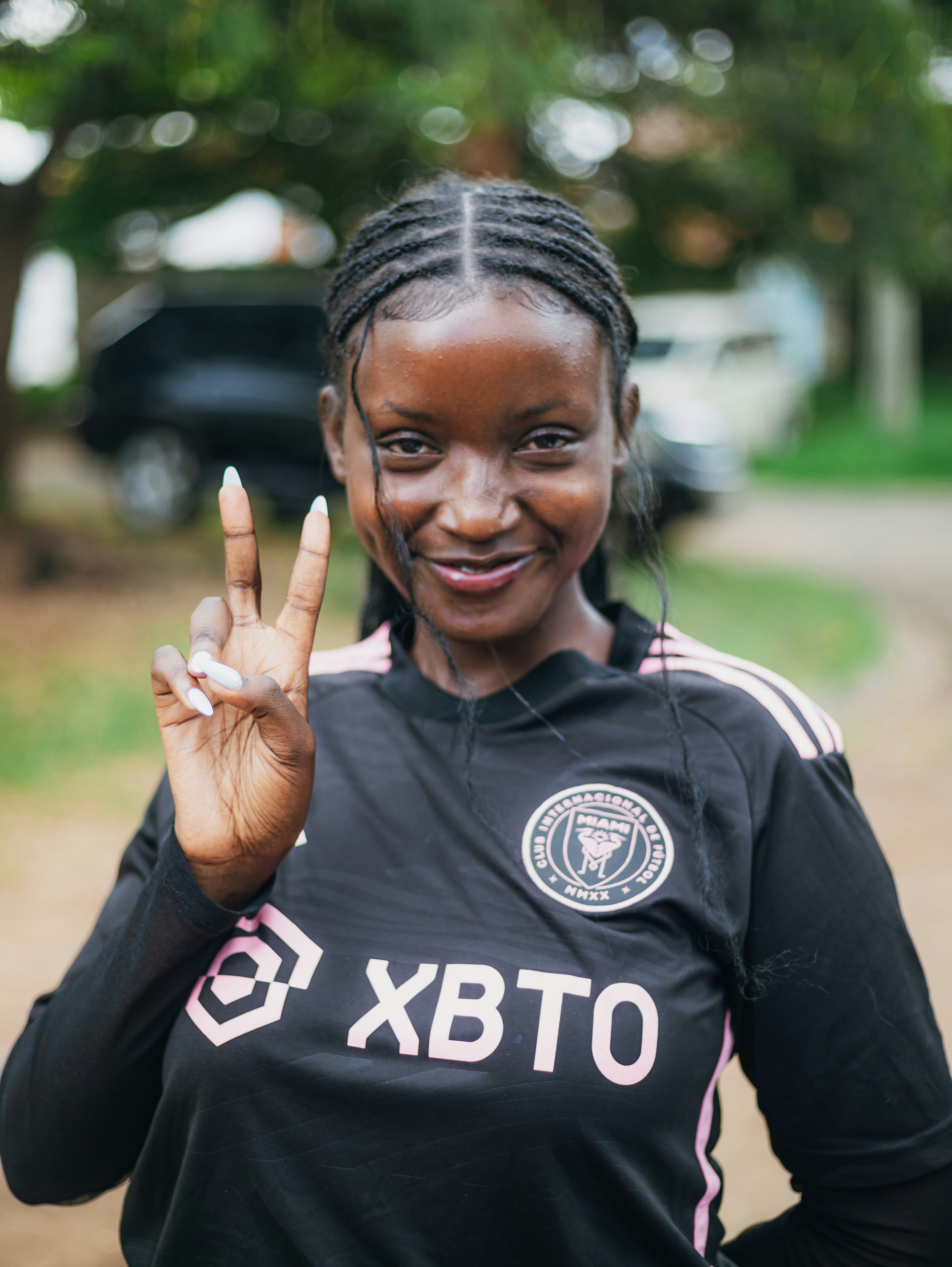Victory Smile: Portrait of Confidence in a Sports Jersey