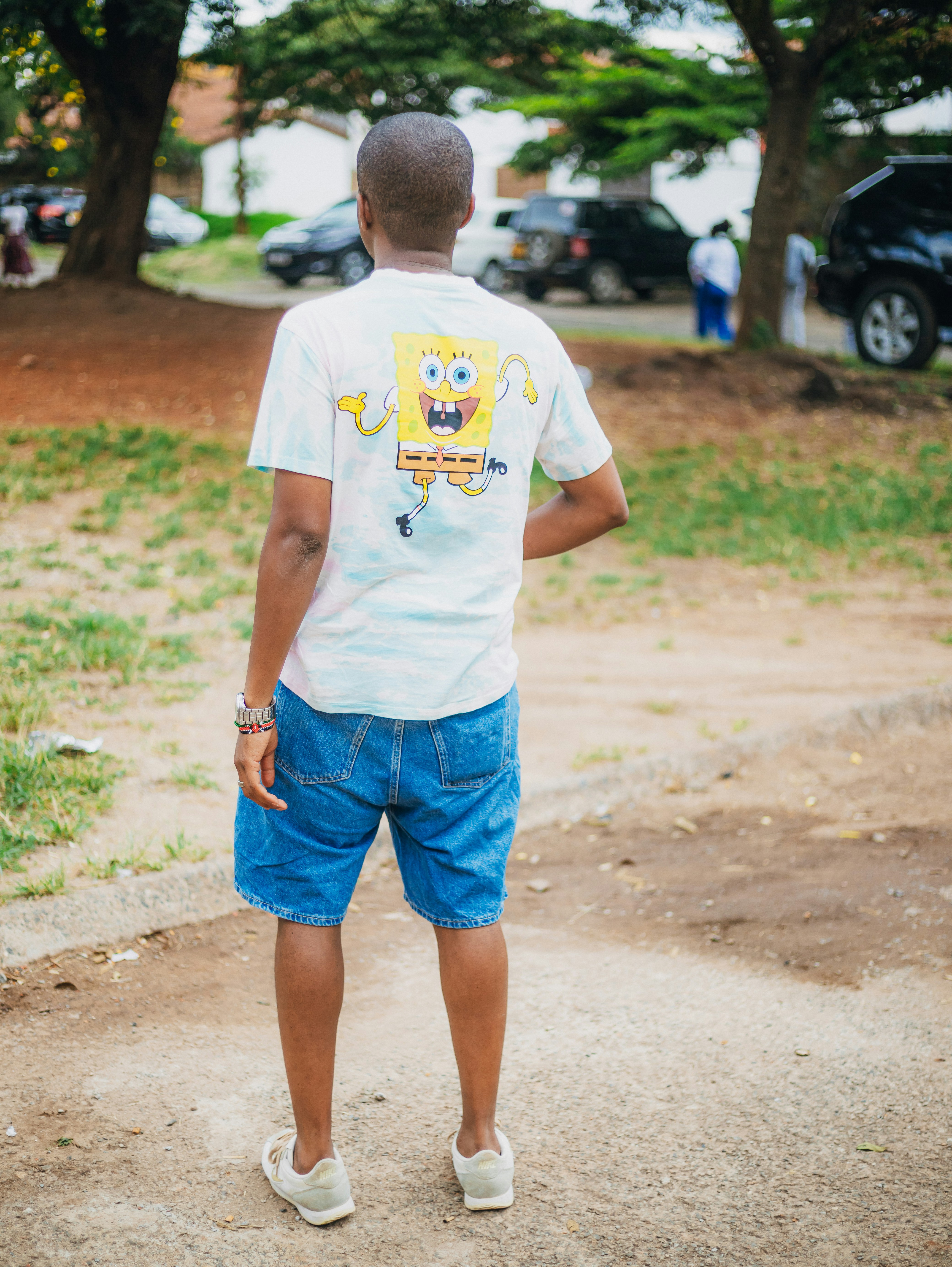 Back View of a Casual BMX-like Scene: SpongeBob Tee in a Sunlit Park