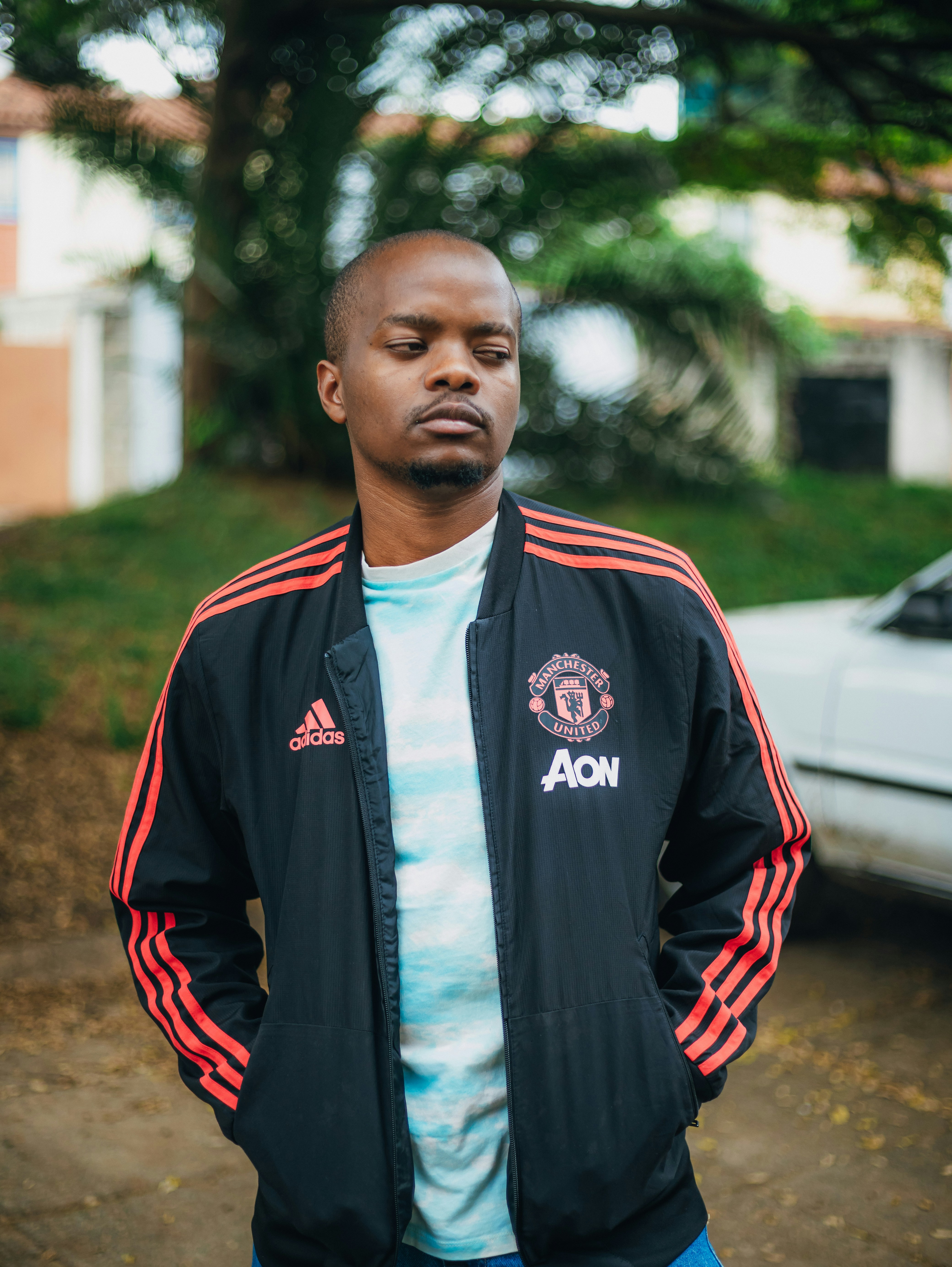 Portrait in the Park: A contemplative moment in a Manchester-style tracksuit