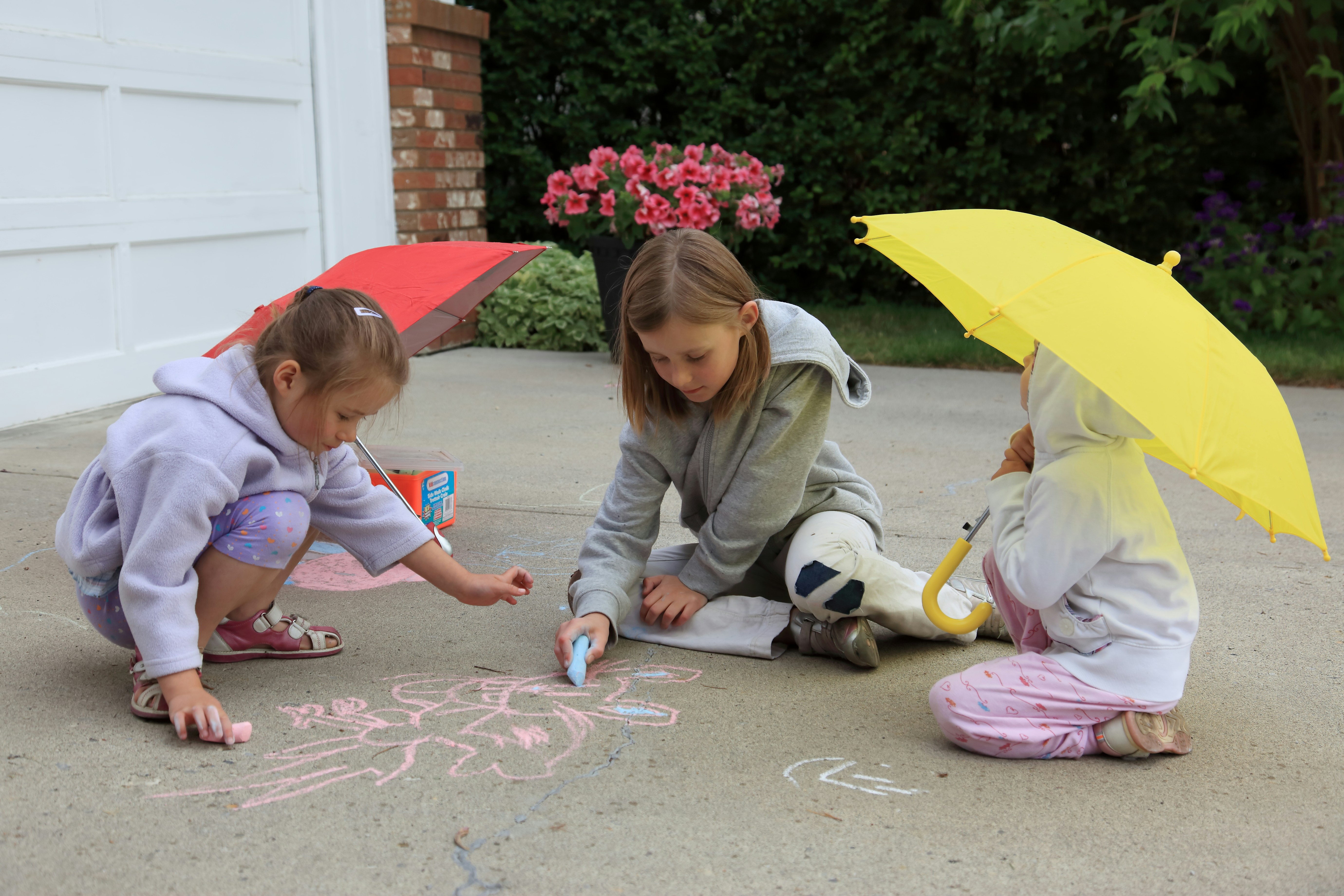 Side-by-Side Chalkwork: Kids Create on the Driveway