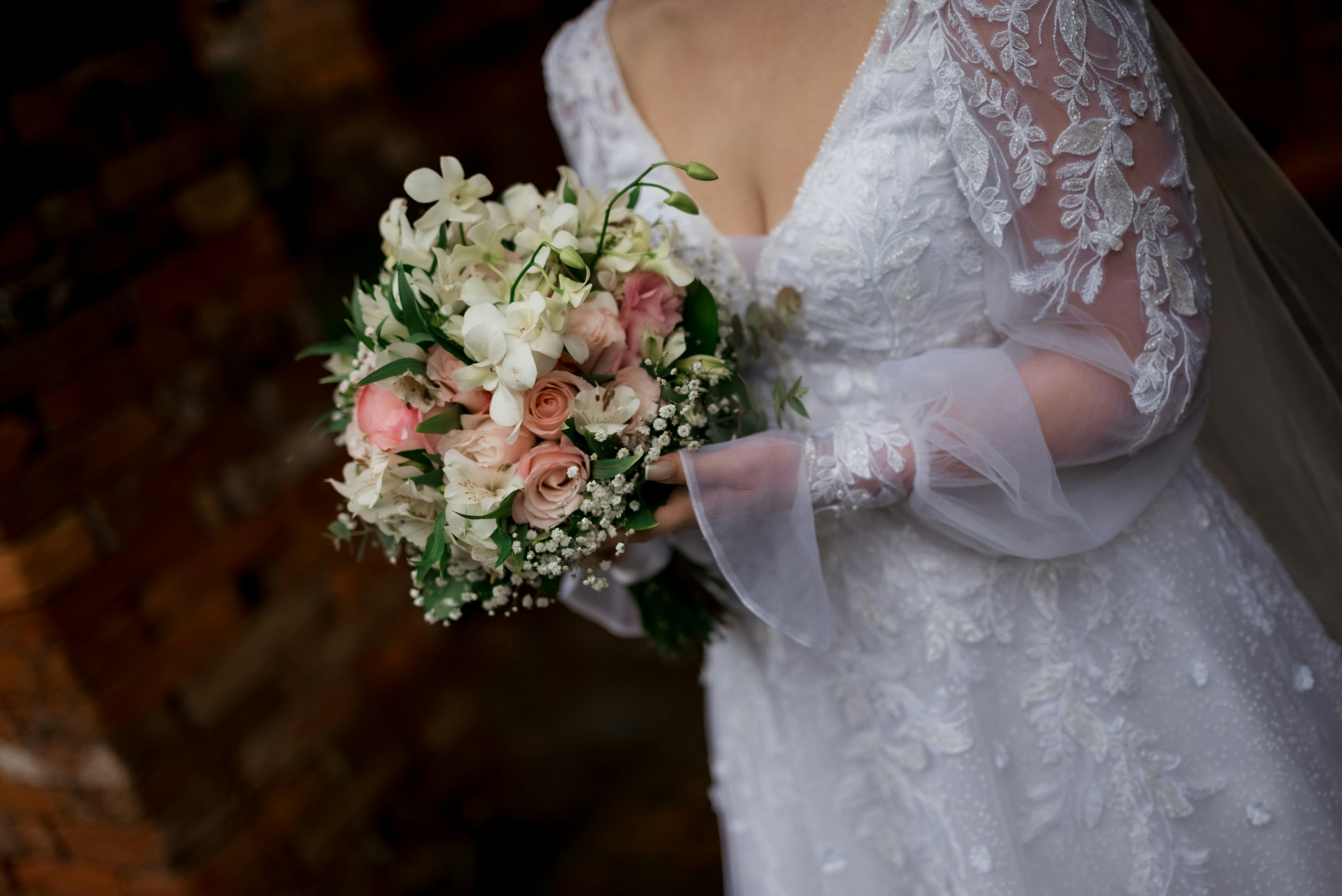 Bouquet Close-Up: Ivory Lace and Blush Roses in Hand
