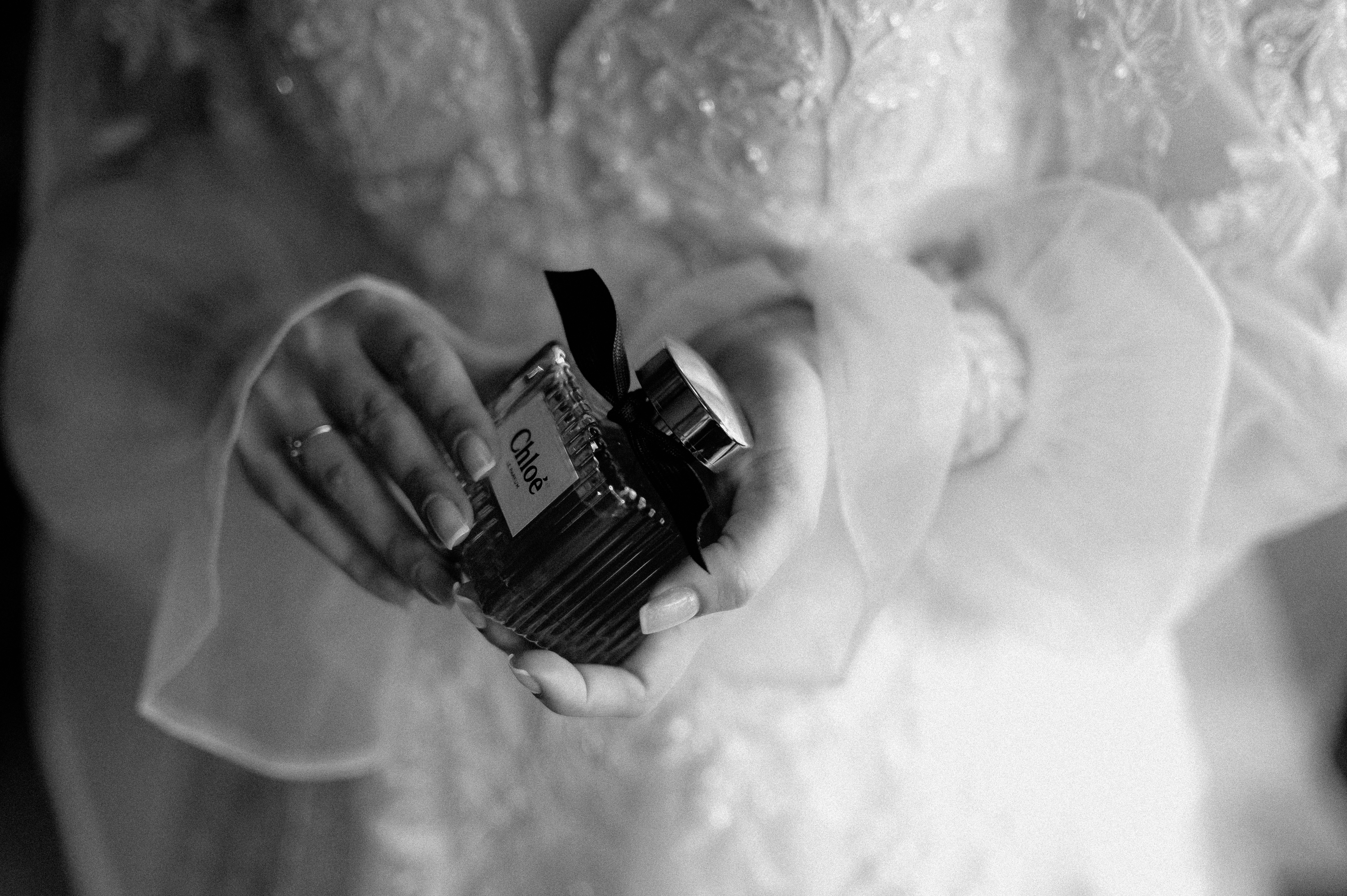 Fragrant Focus: A Tender Bottle in Velvet Hands