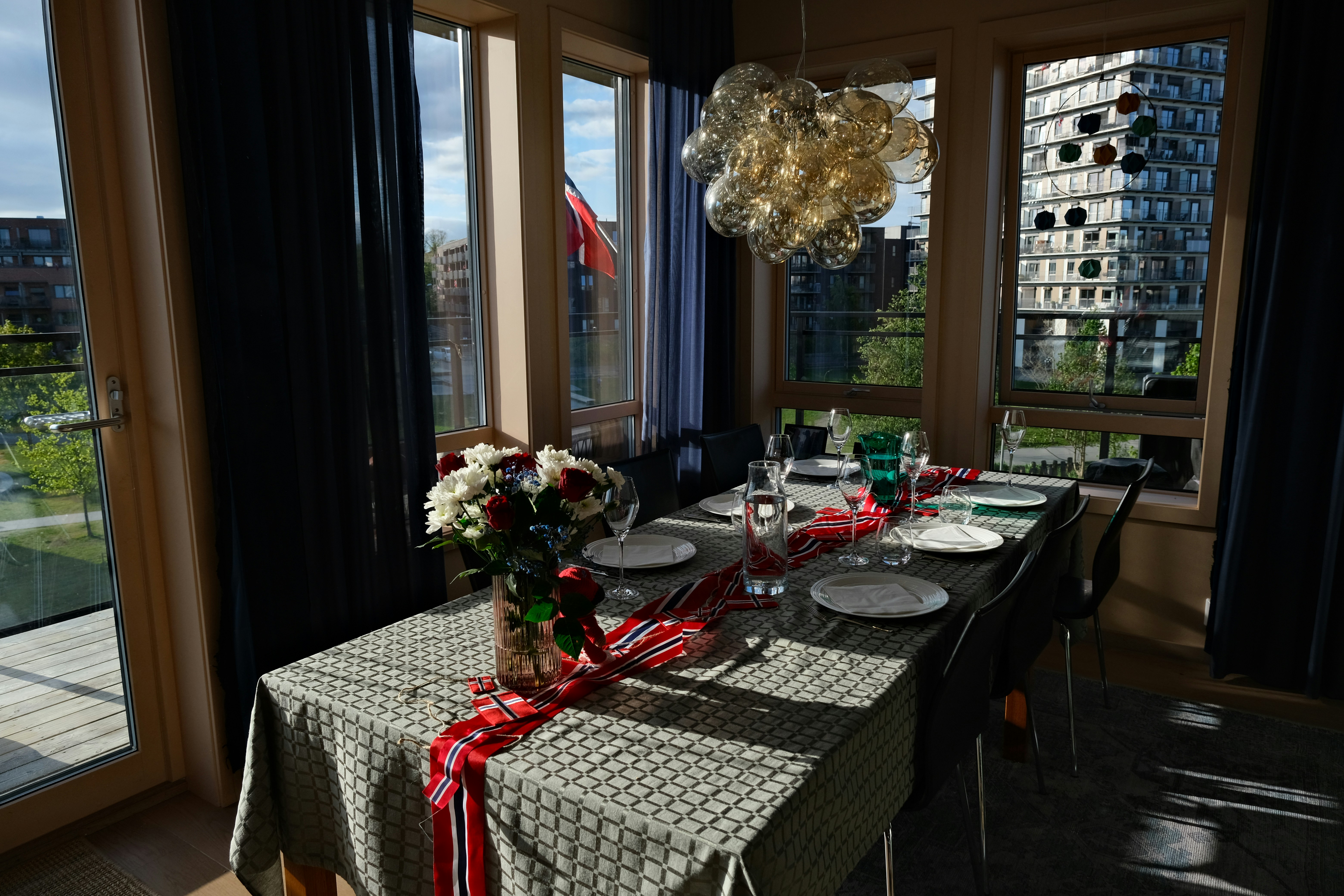 Festive dining nook bathed in afternoon light