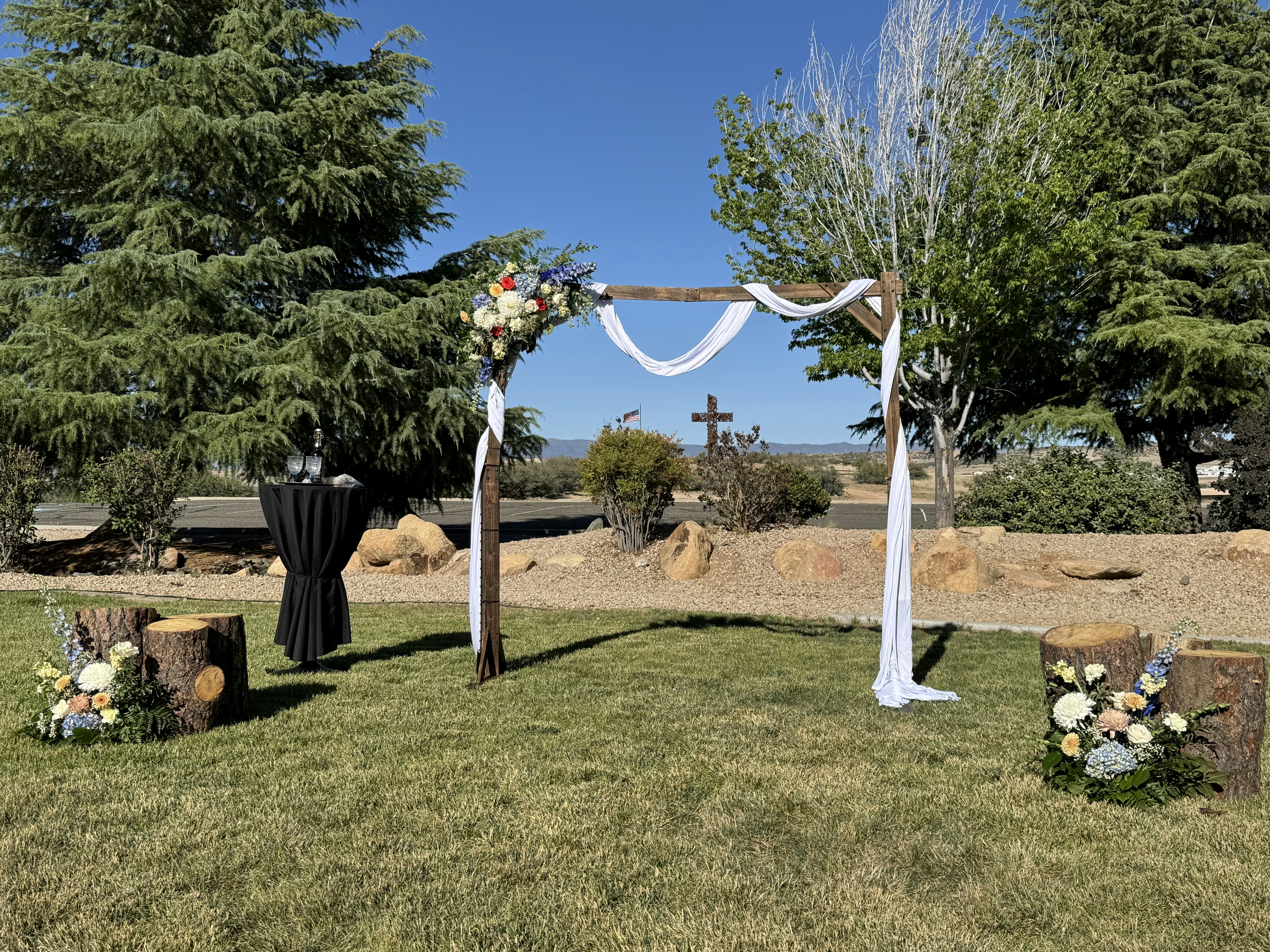 Ceremonial Archways Overlooking a Serene Outdoor Venue