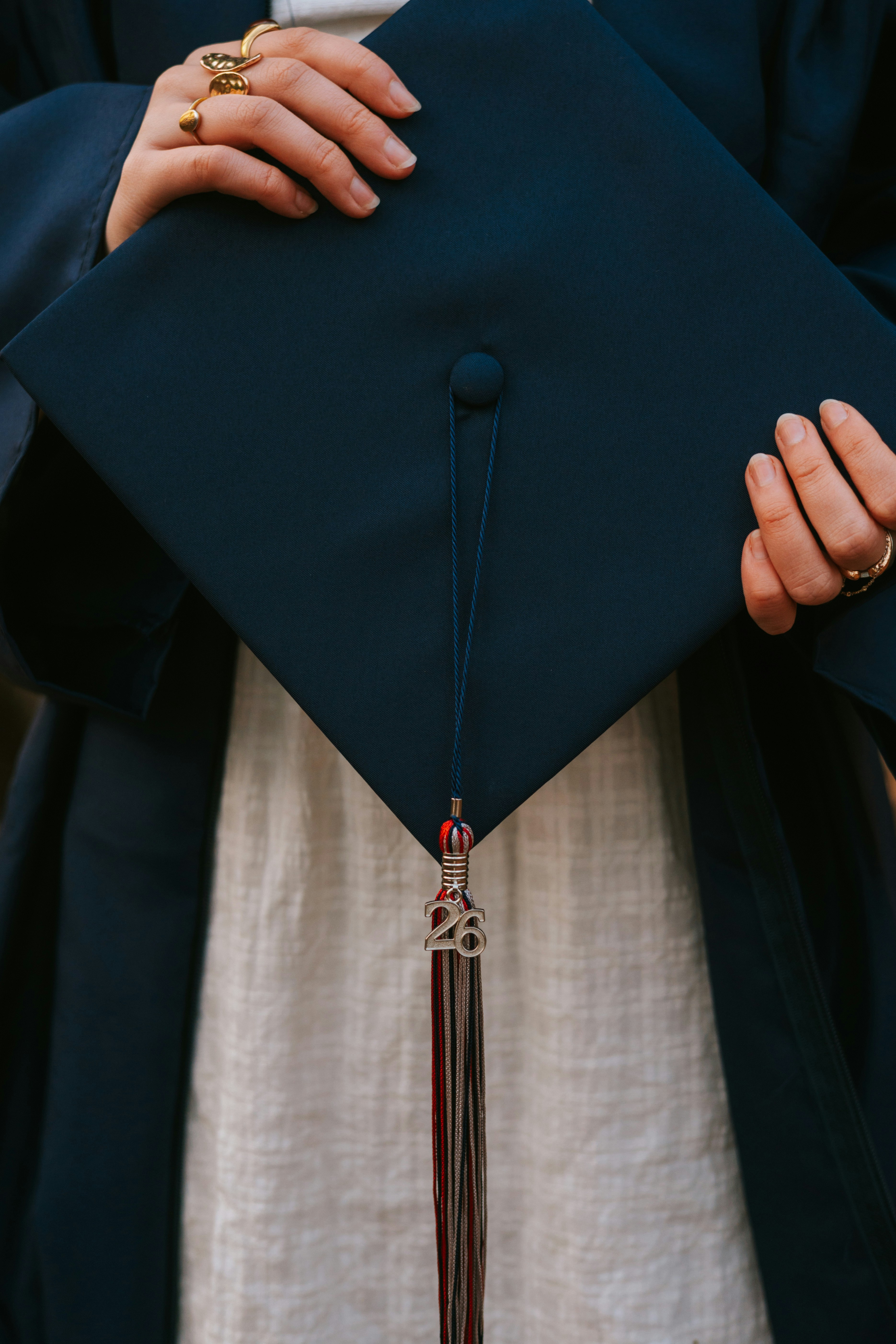 Midnight Blue Graduation: A Graceful Grasp of the Cap