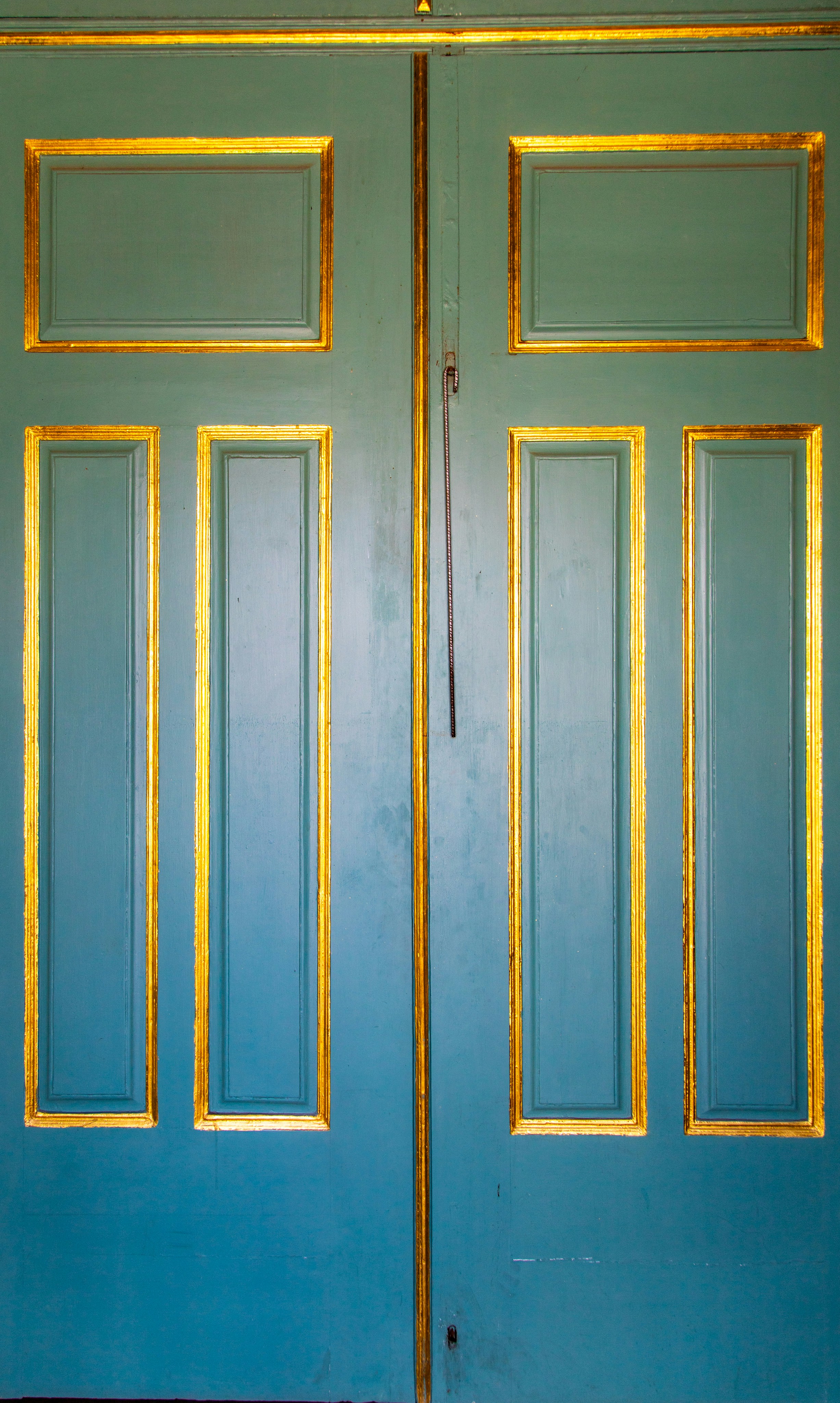 Gatekeepers of Teal and Gold