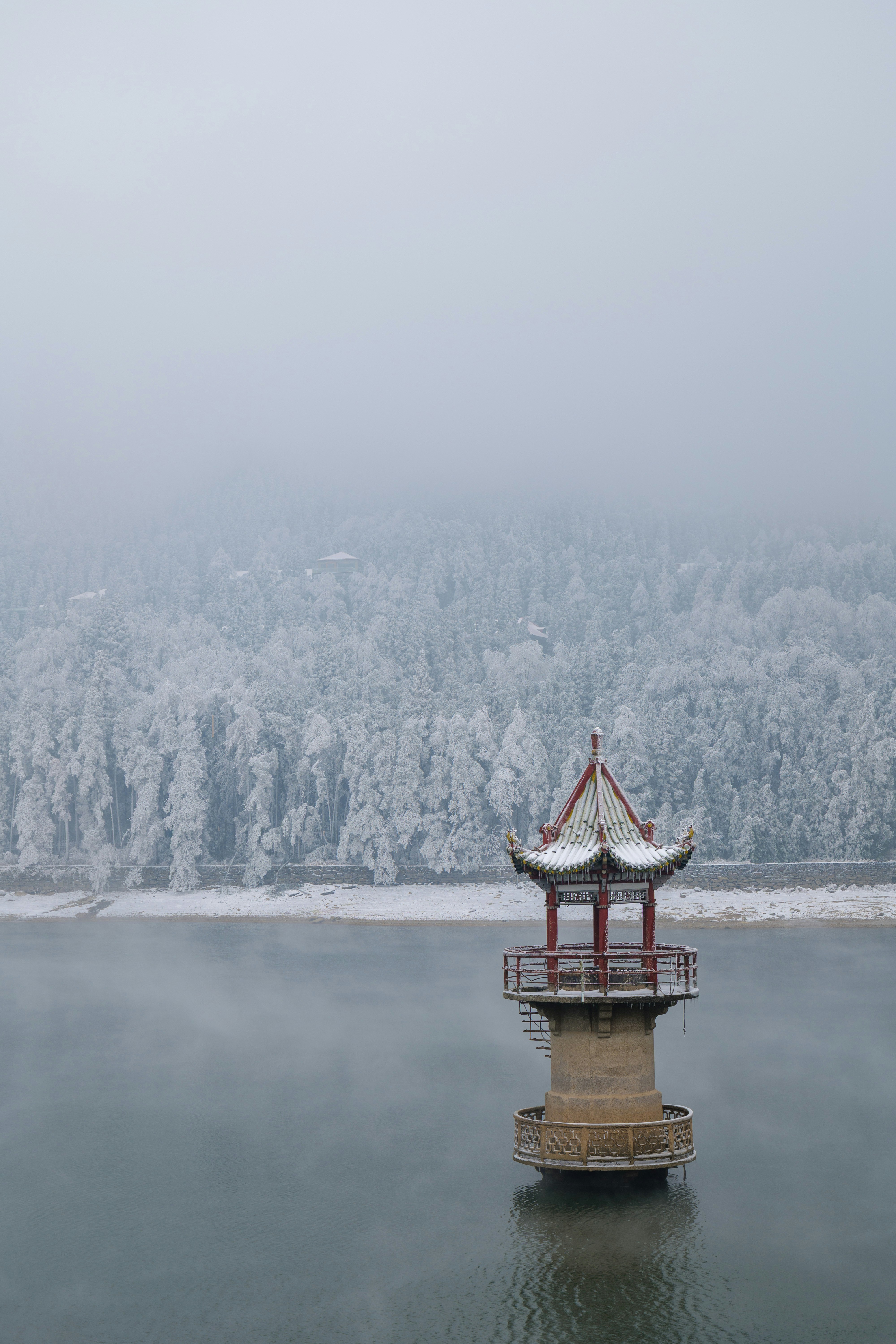 Mist-Laced Lantern in a Frozen Lake