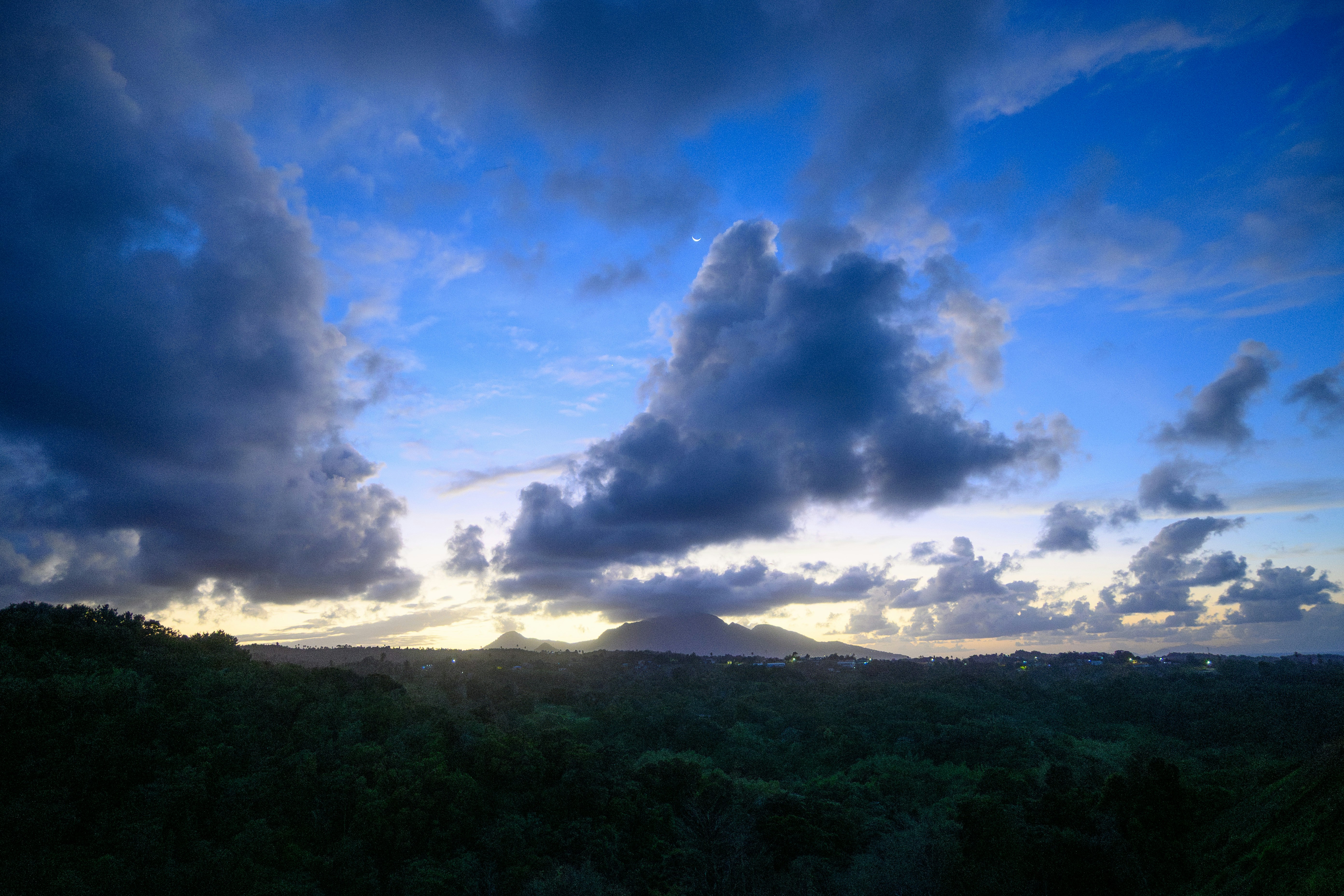 Dusk Over the Gentle Hills: Clouds Draped in Blue Light