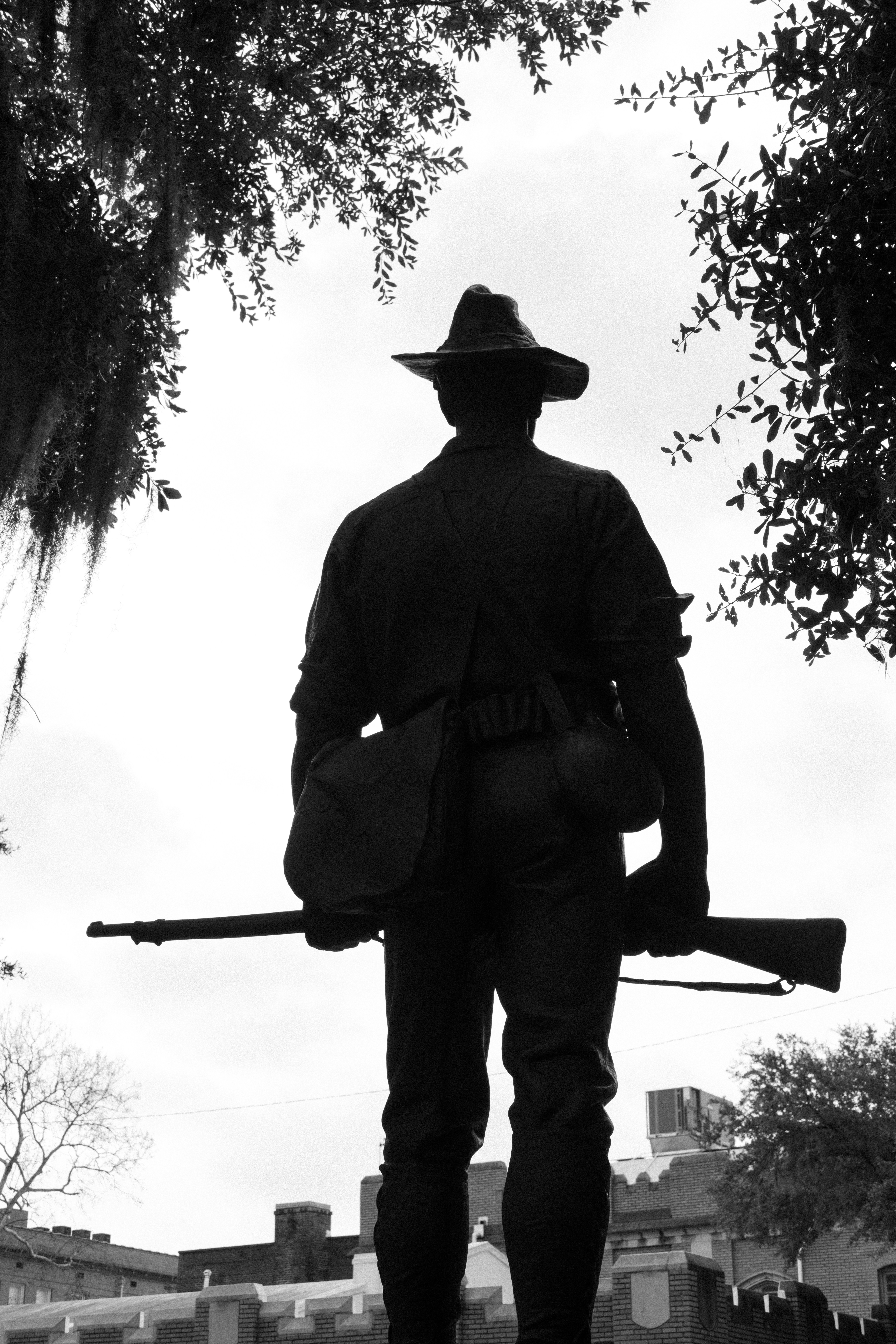Silent Sentinel: silhouette of a rifleman at dusk