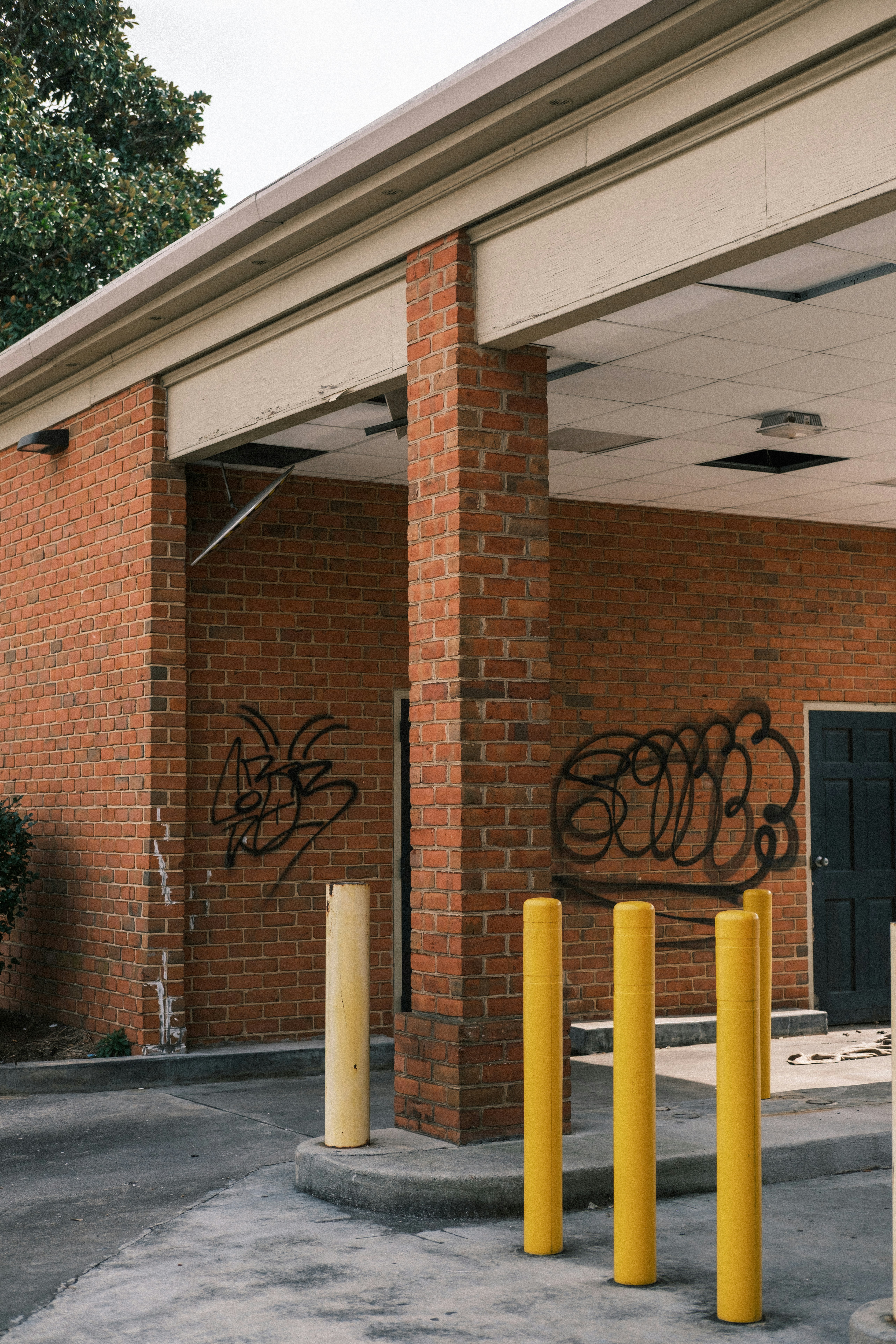 Industrial Bricks and Bright Markers: A Corner of the Quiet Garage