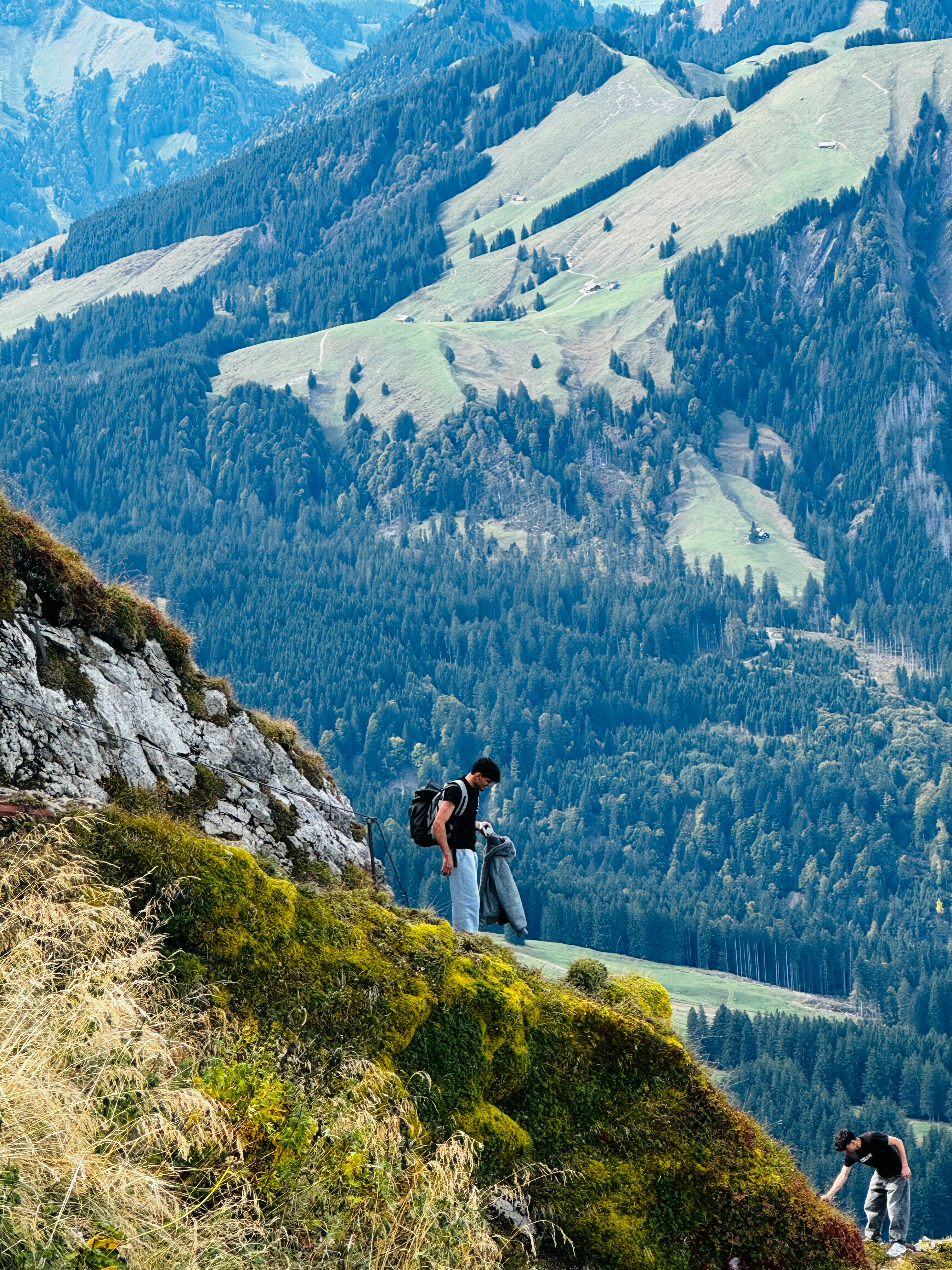 Hiker on a Ridge: Quiet Scale of the Alpine Landscape
