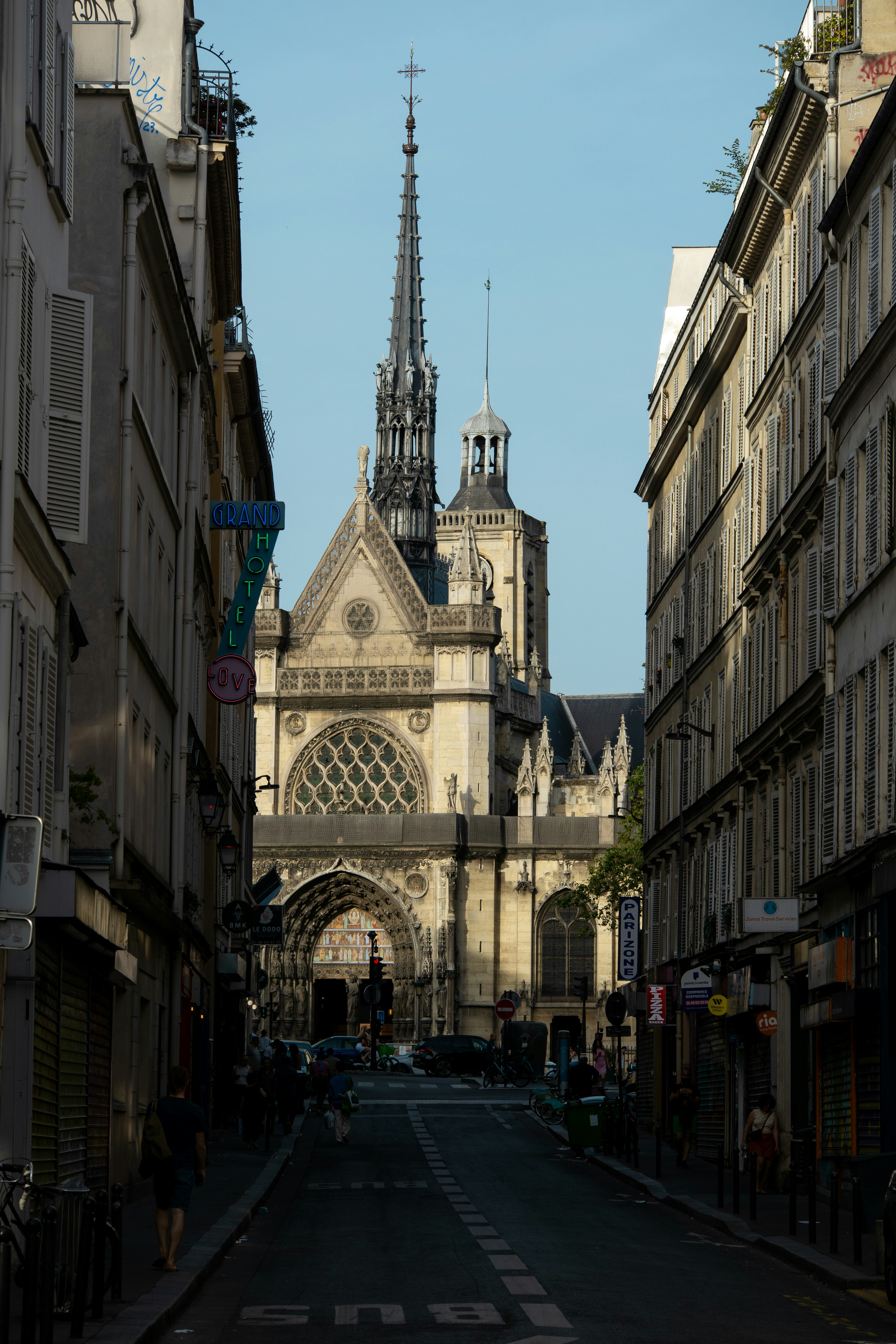 Gothic Cathedral Framed by a Quiet Parisian Street