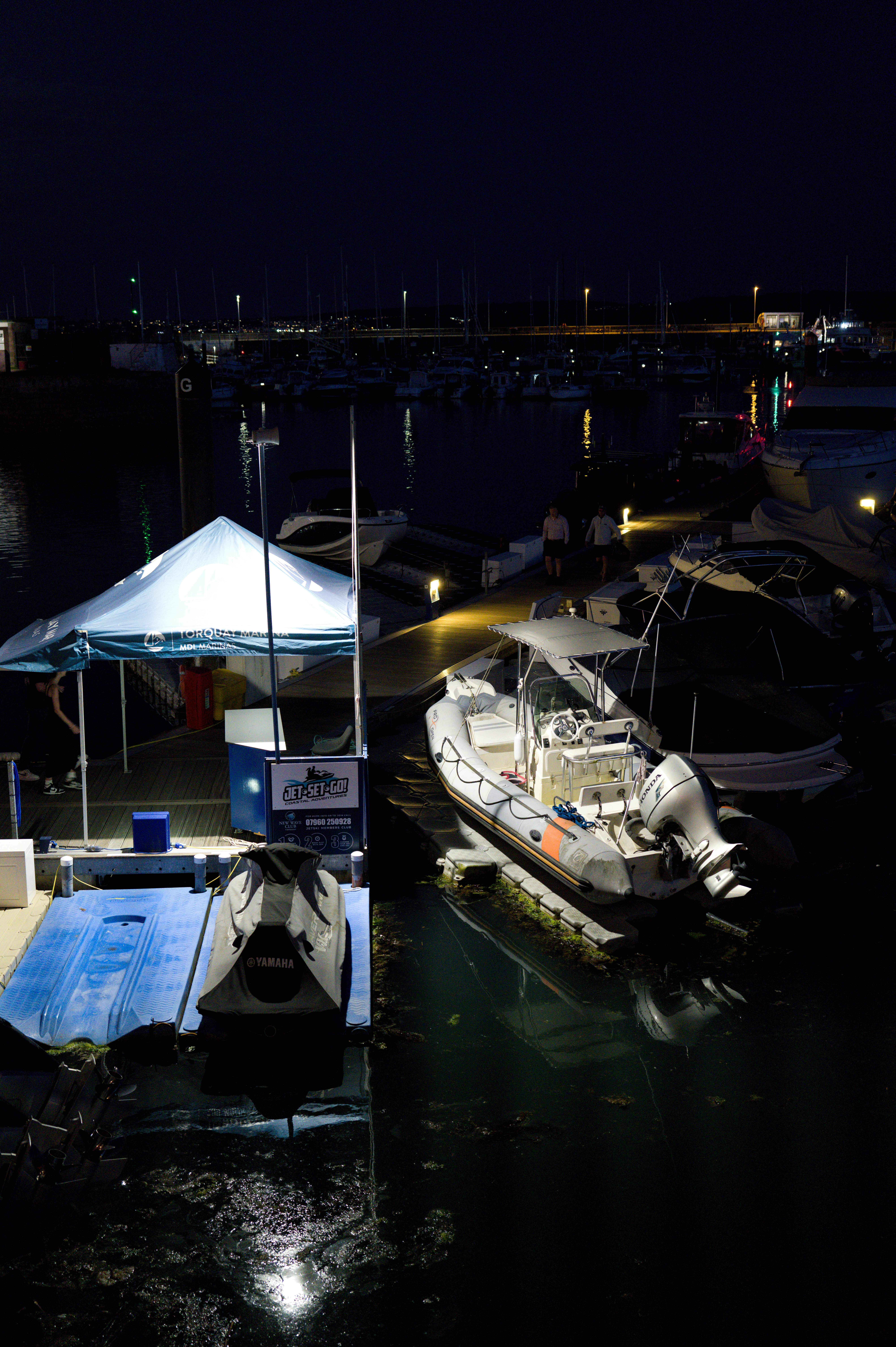 Night Marina Under Tent Lights