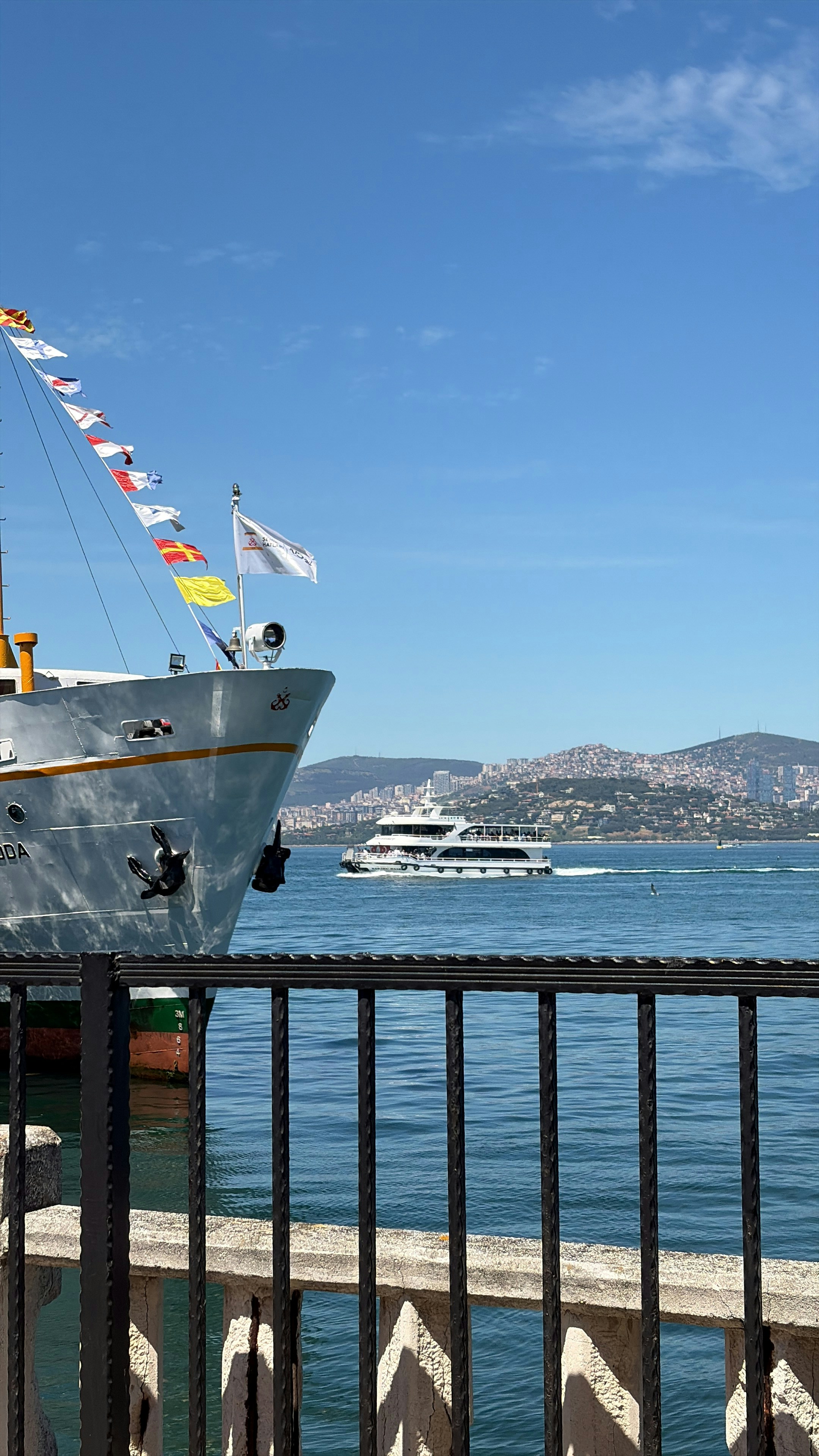 Harbor Vessel at Distant Promenade