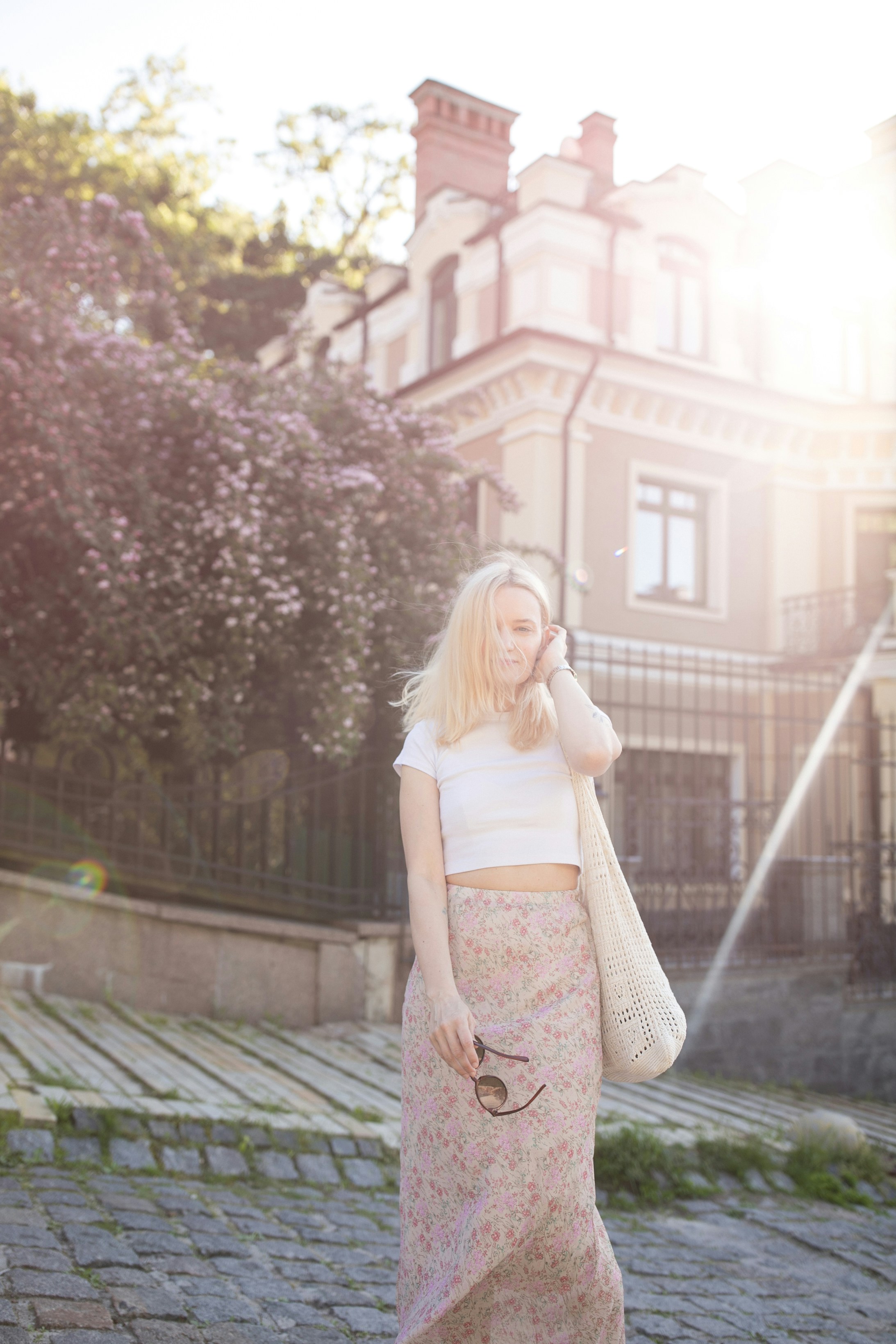 Sunlit Street Portrait: A Girl in Bloom