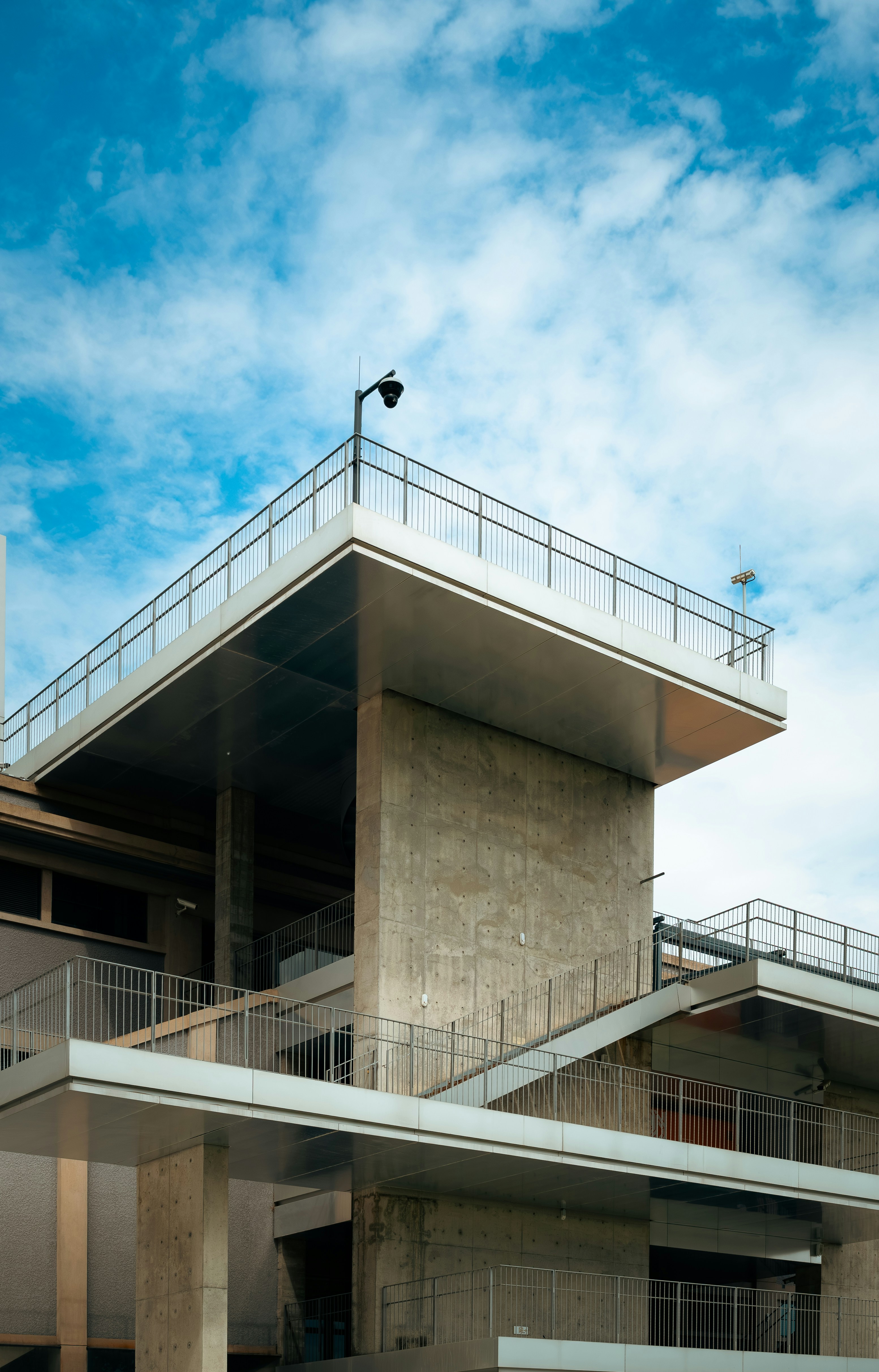 Concrete Observation Platform Reaching Toward a Blue Sky