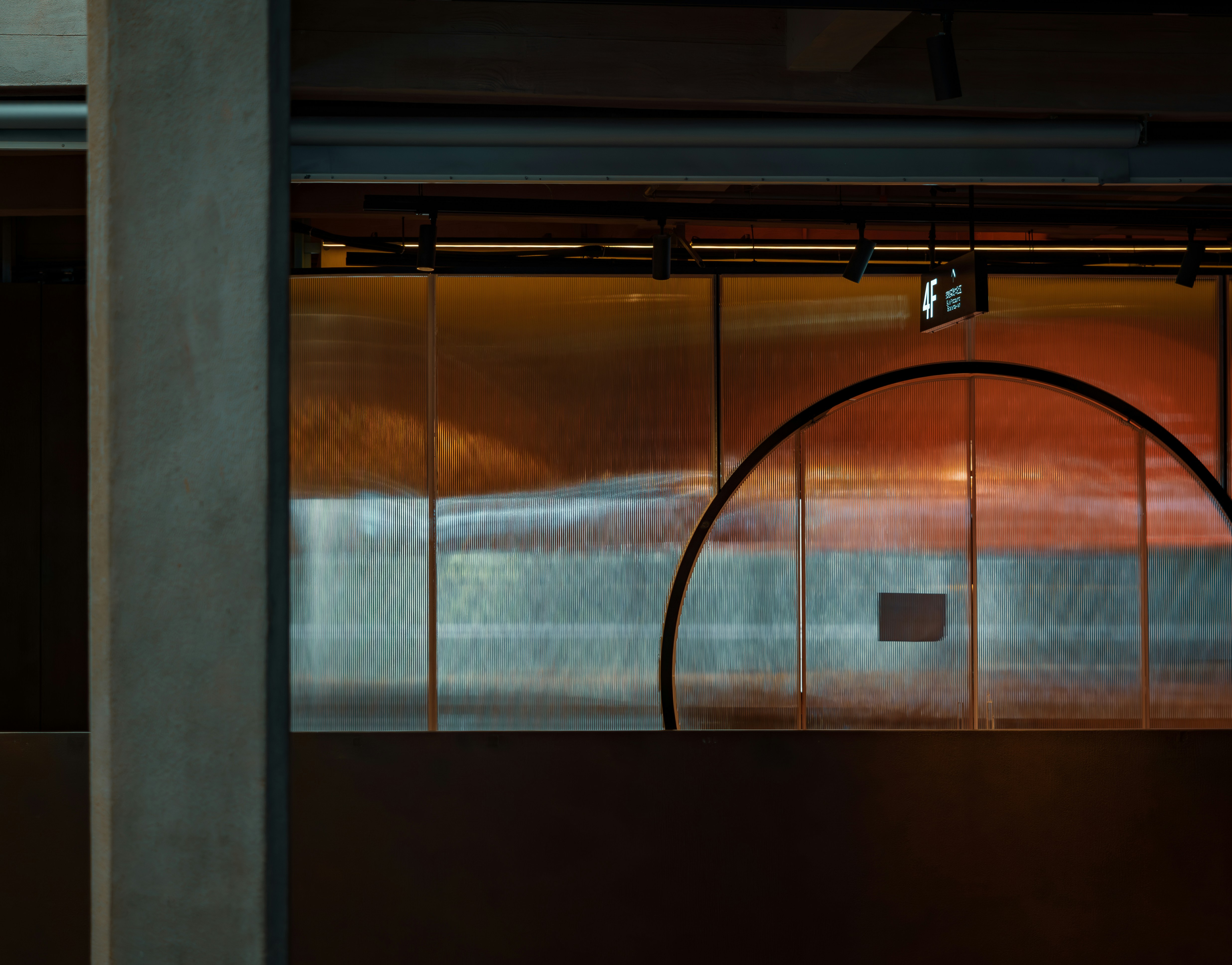Circles and Glass: Suburban Geometry in Dim Light