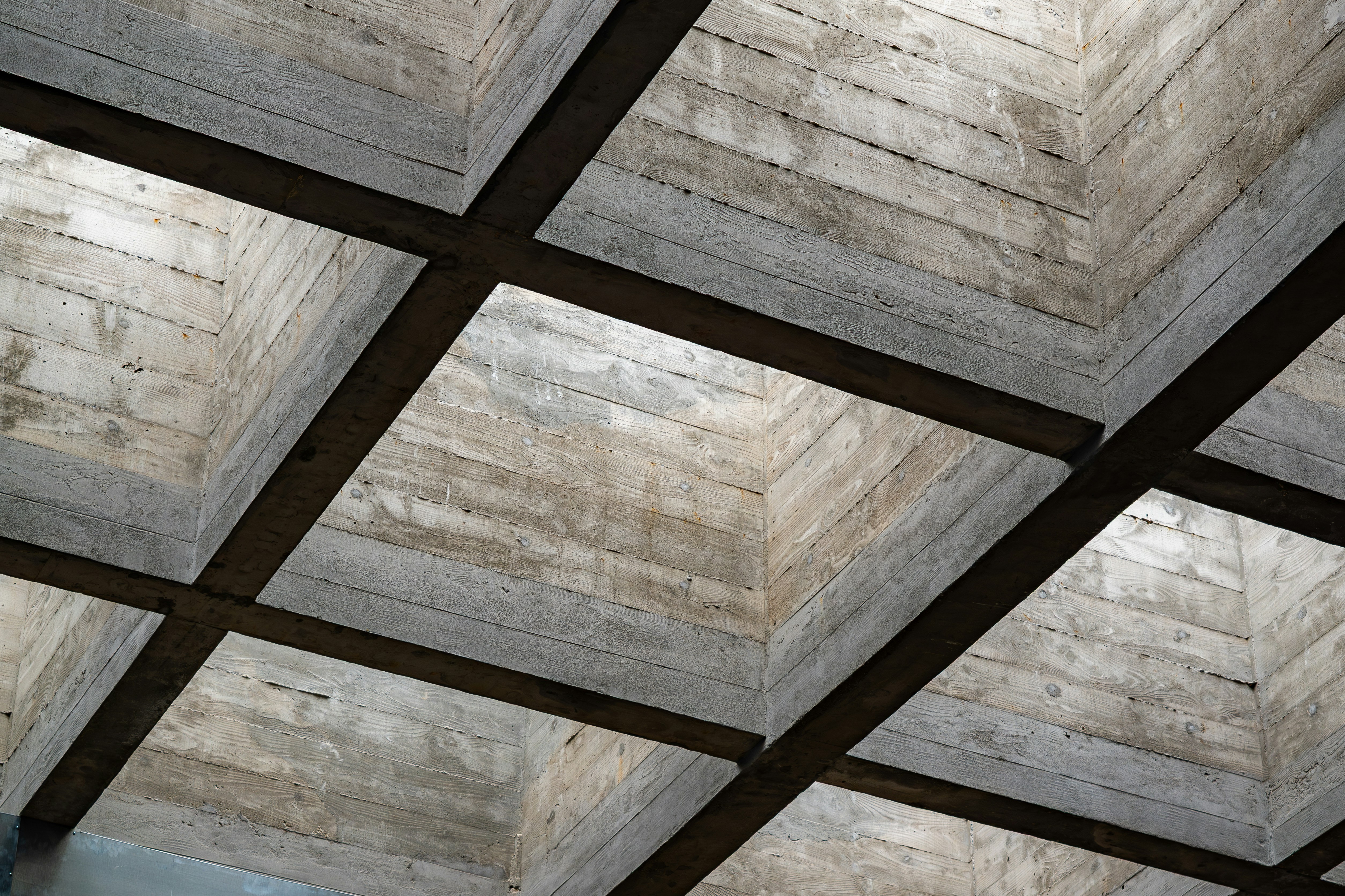 Ceiling Grid of Concrete Beams and Lighted Panels