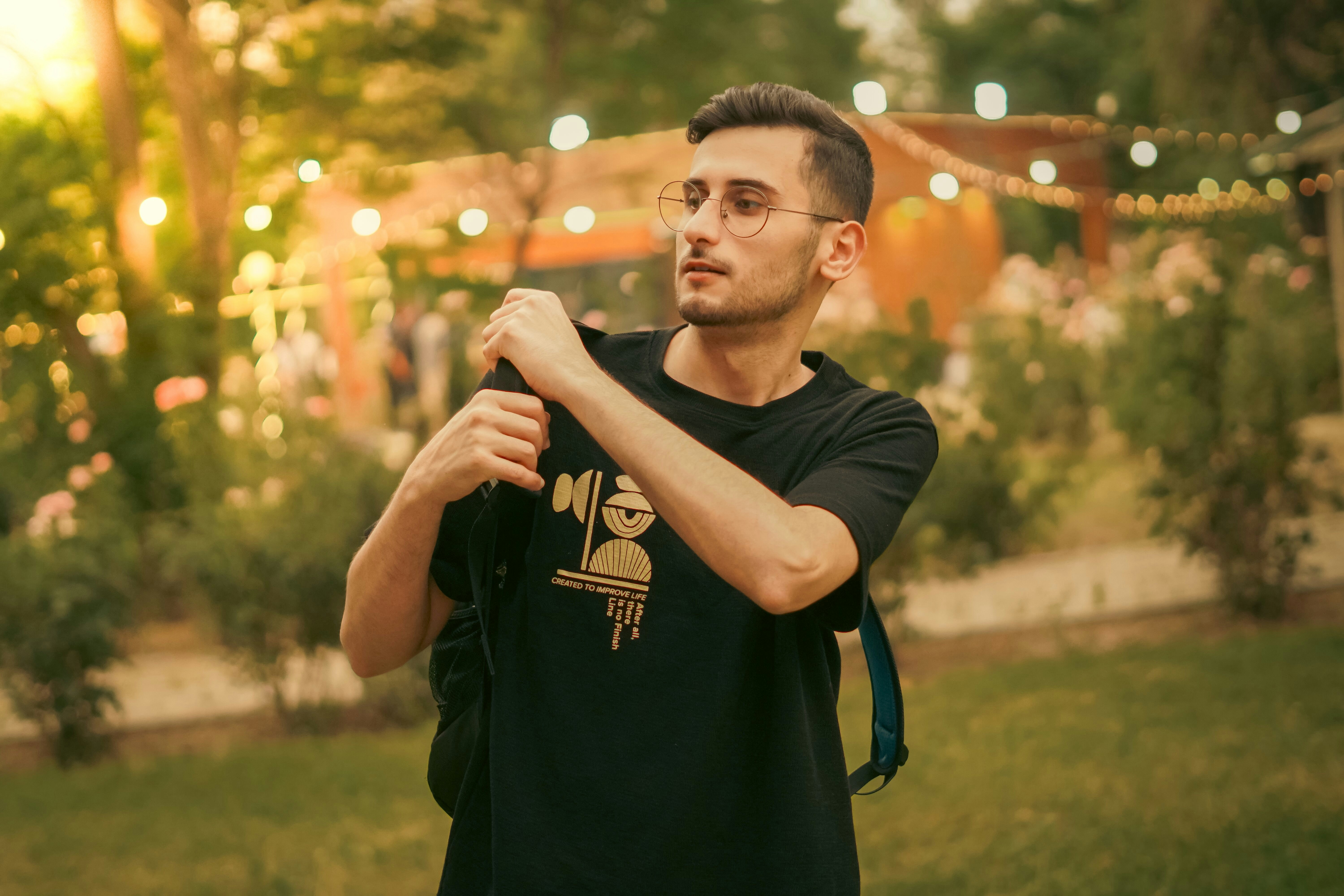 Midfield Gaze: A Portrait Under Ambient Garden Lights