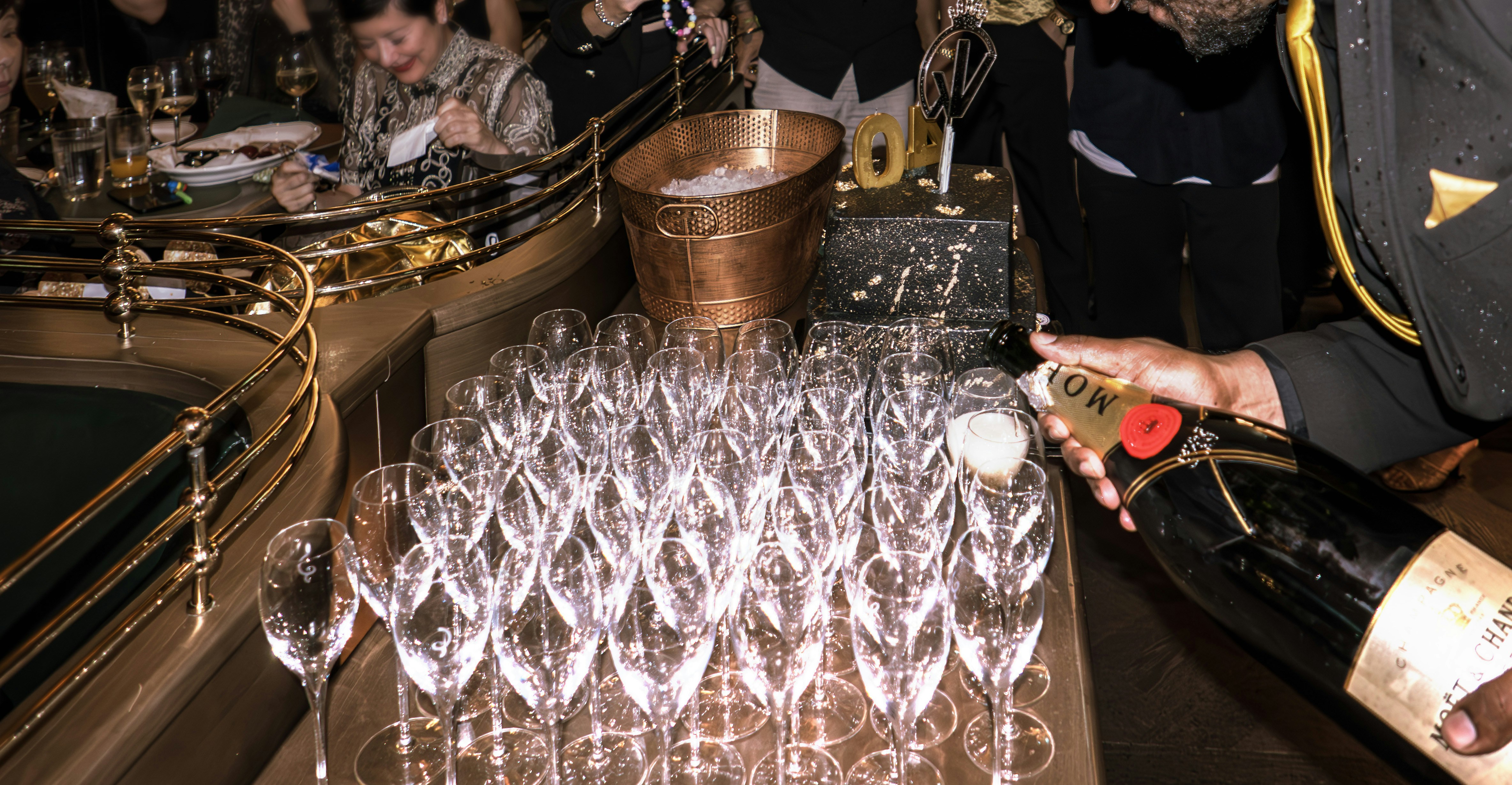 Champagne Ceremony: Pouring Glittering Bubbles at a Gala