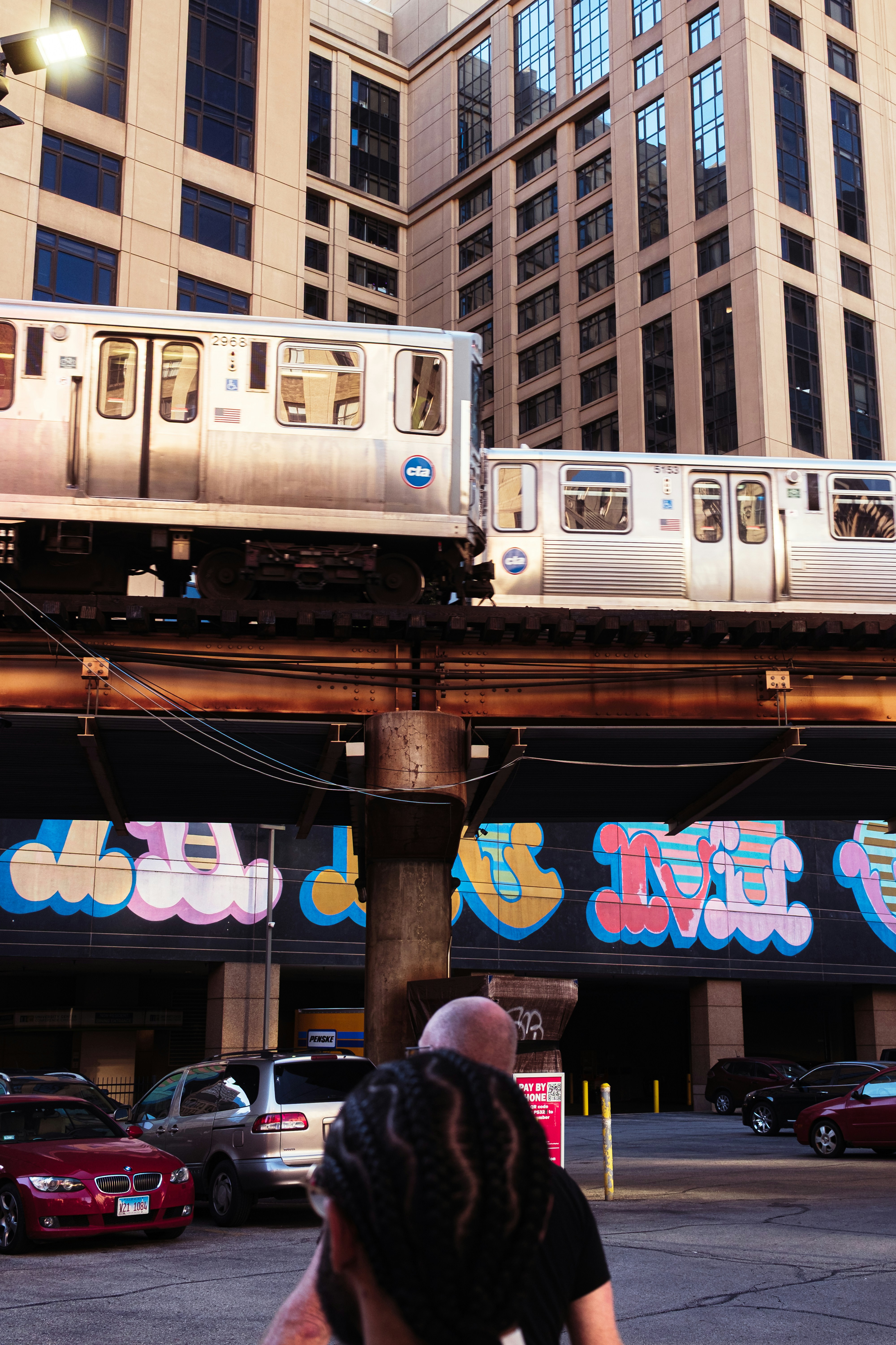 Elevated Transit and Street Art: A Moment Beneath the Tracks