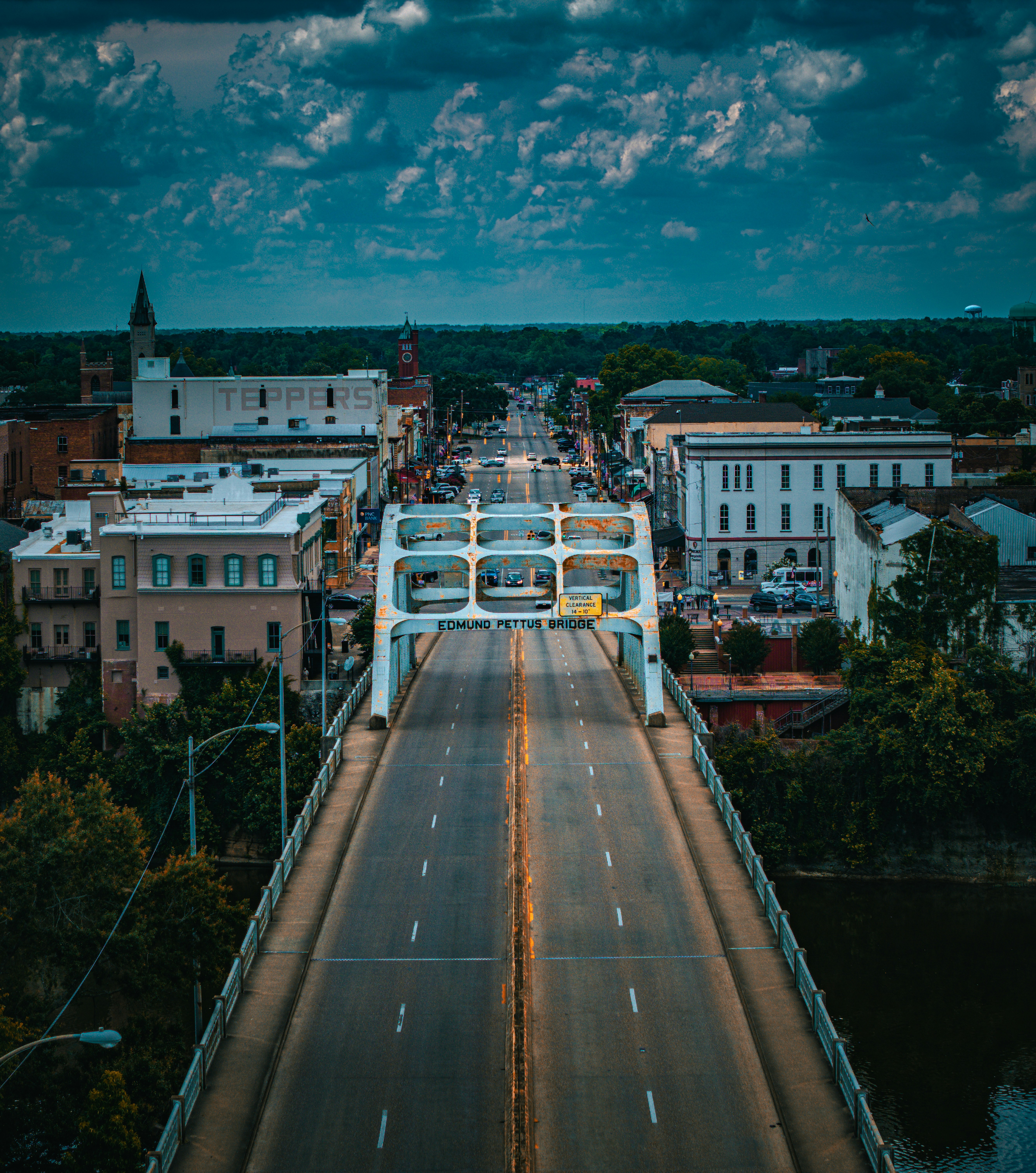Bridge Cut Through the City: Aerial View Over Edges of a Town