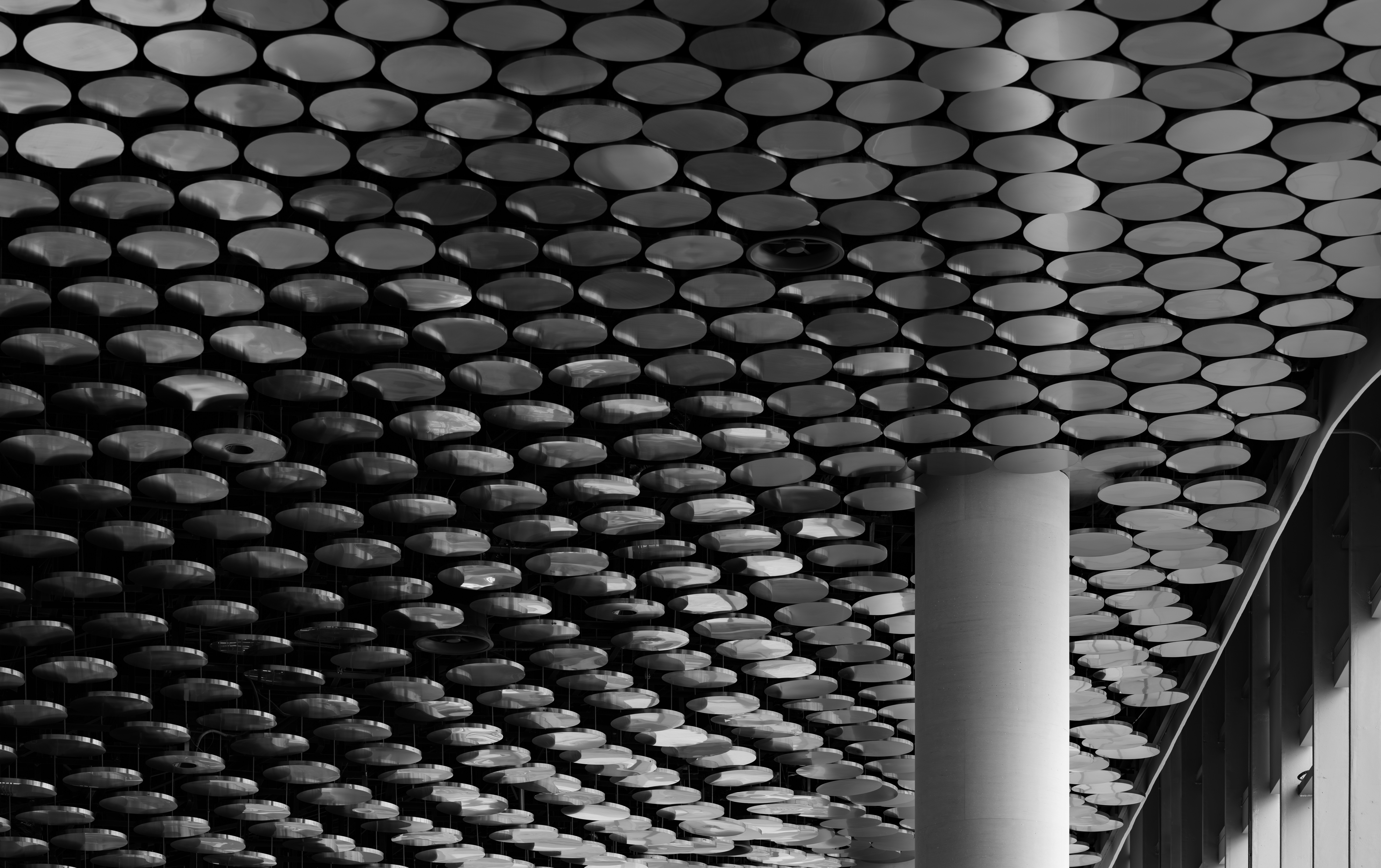 Circular Ceiling Orchestra: A Repetition of Disks Above a Minimal Column