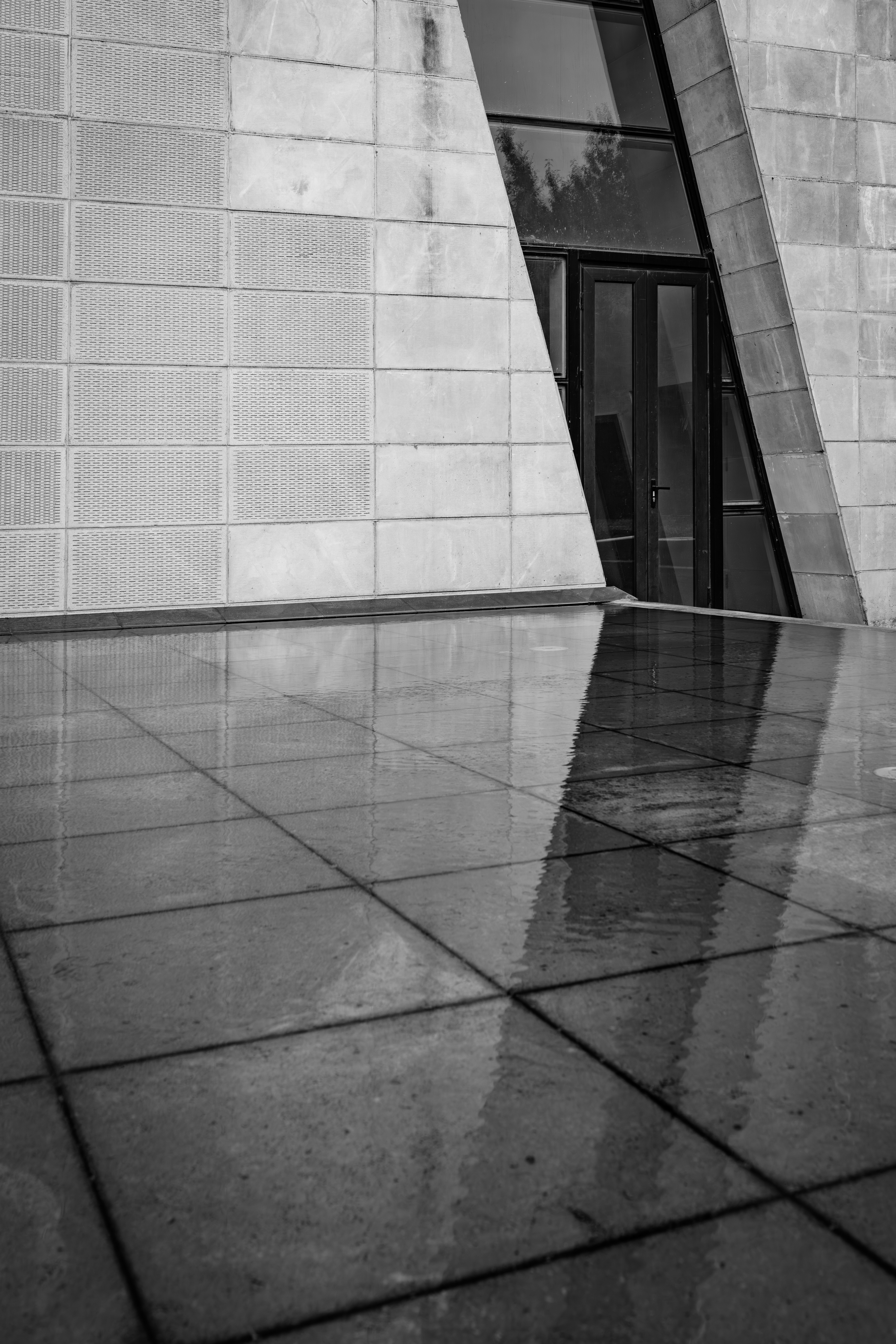 Geometric Threshold: Wet Tiles and Slanted Glass