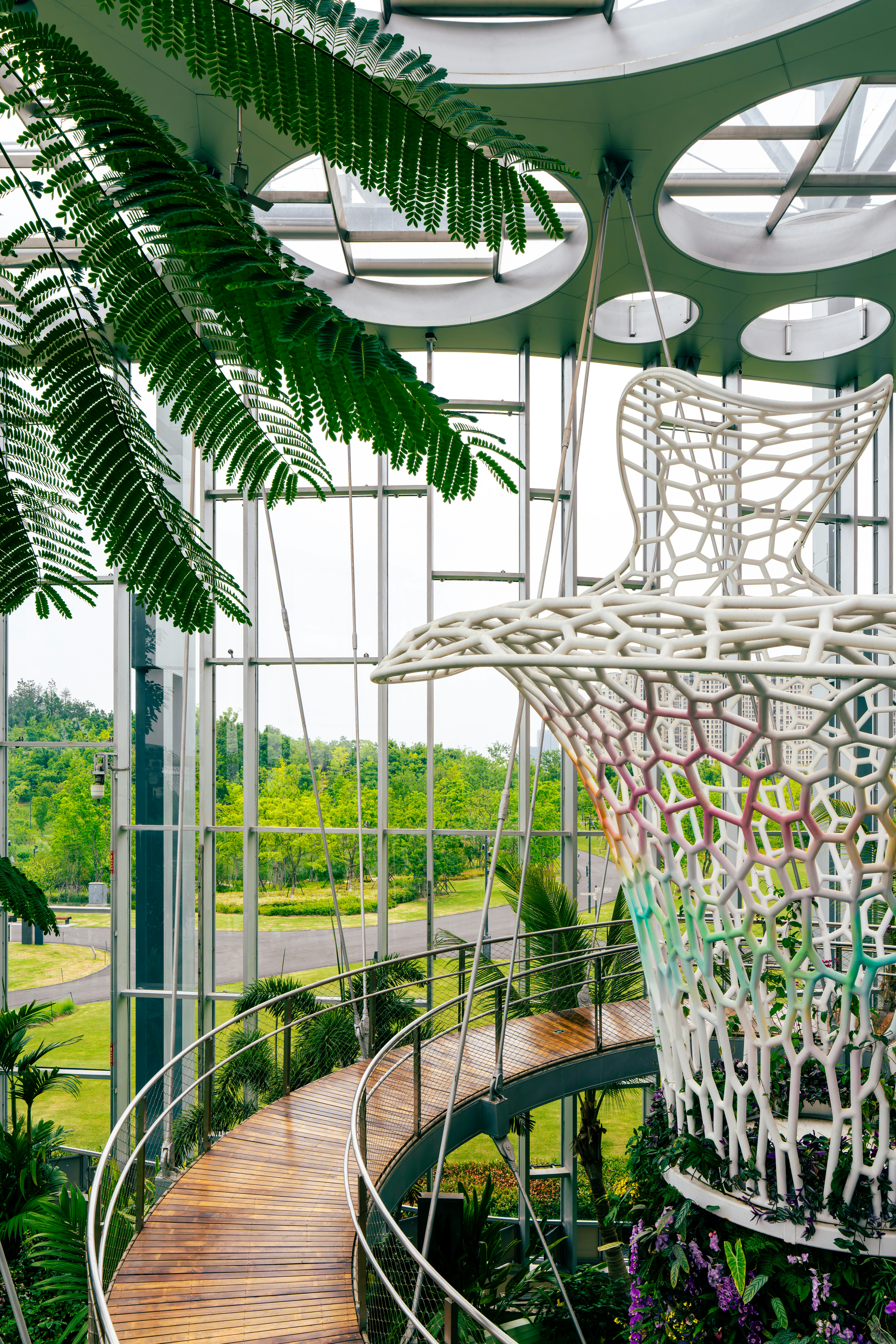 Suspended Haven: A Woven Chair in a Glass Conservatory