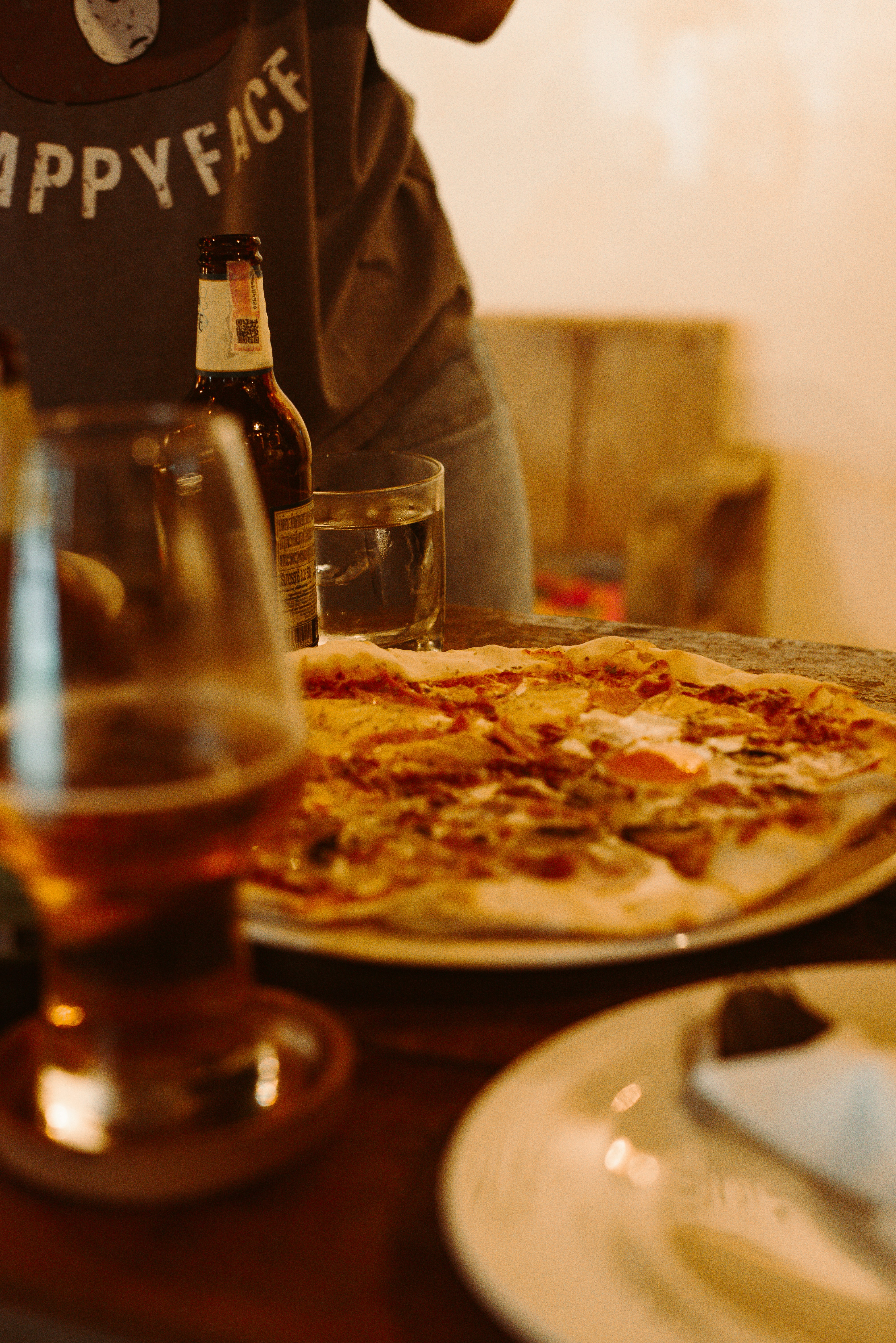 Pizza, Bottles, and Warm Glow: Casual Night In with Friends